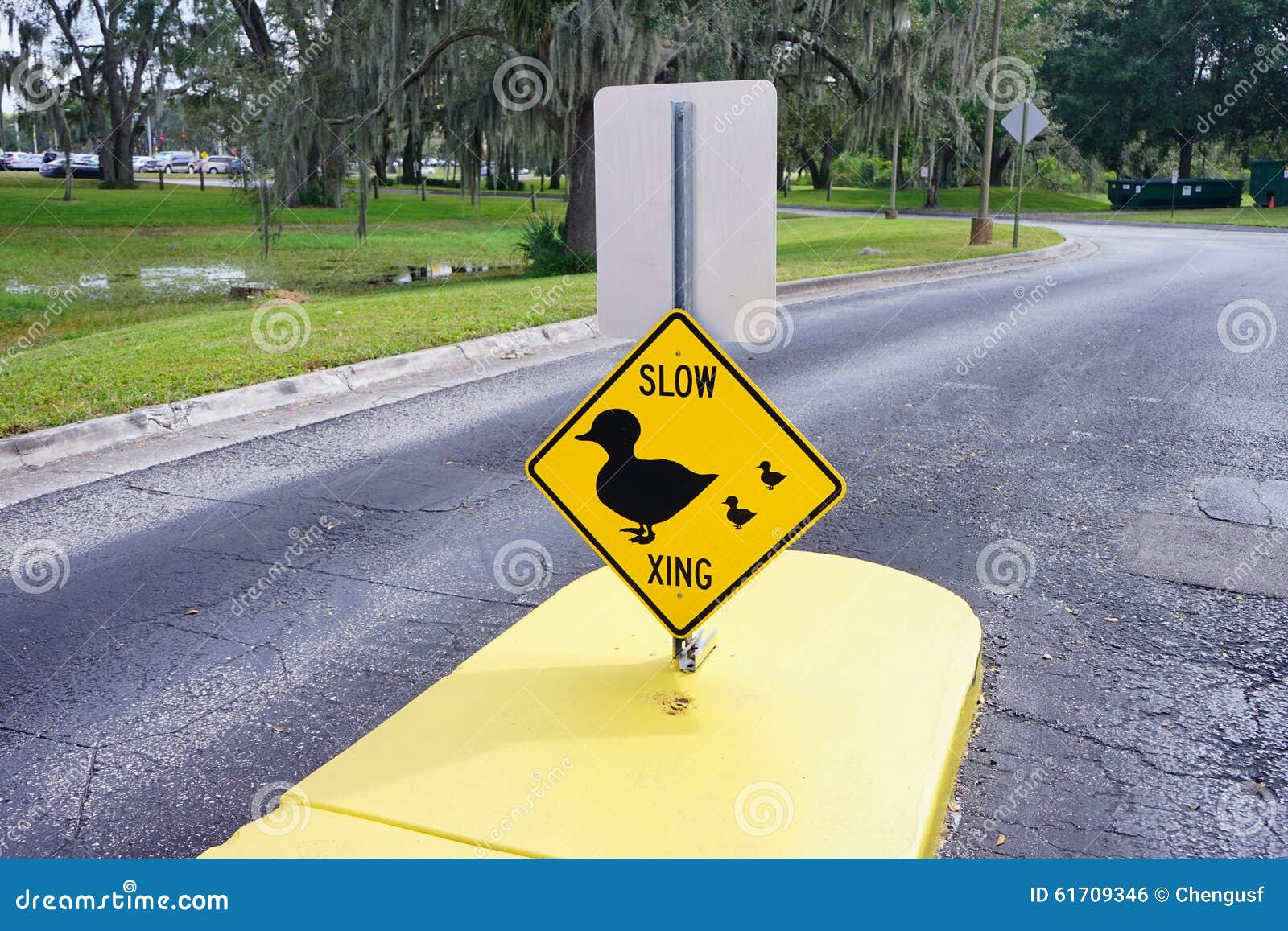 Slow xing sign stock photo. Image of outdoor, rainstorm - 61709346