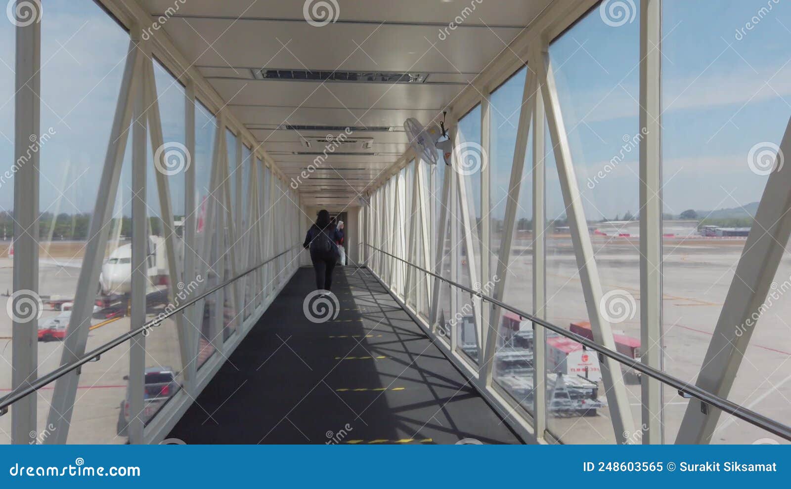 Slowmotion View while Walking on Airplane Bridge To Boarding Airplane ...