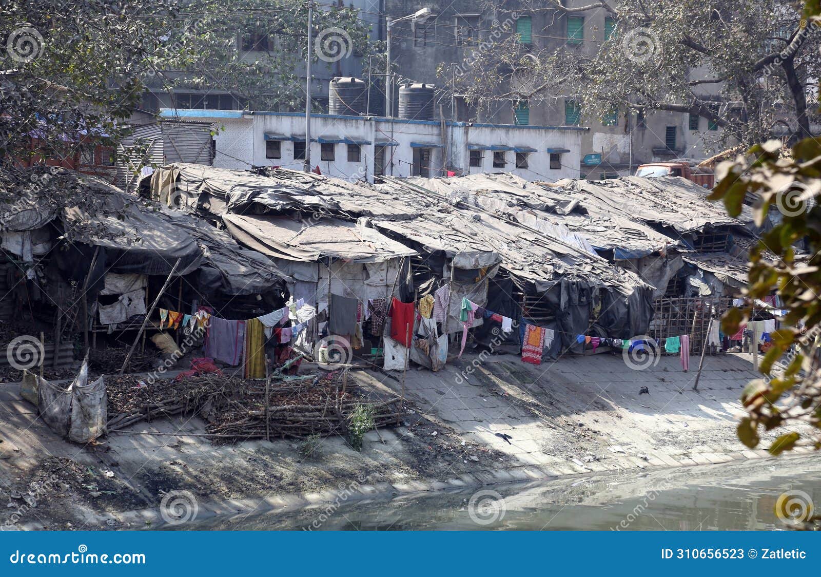 Slums in Kolkata, India stock image. Image of disease - 310656523