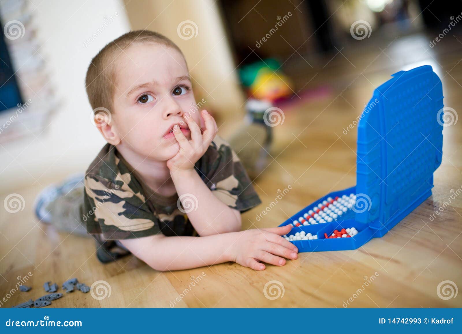 Smal boy is thinking stock image. Image of portrait, education - 14742993