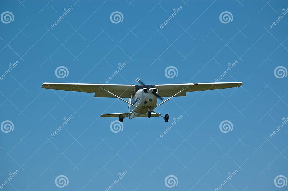 Small Aircraft in Flight with Blue Sky Stock Image - Image of flying ...