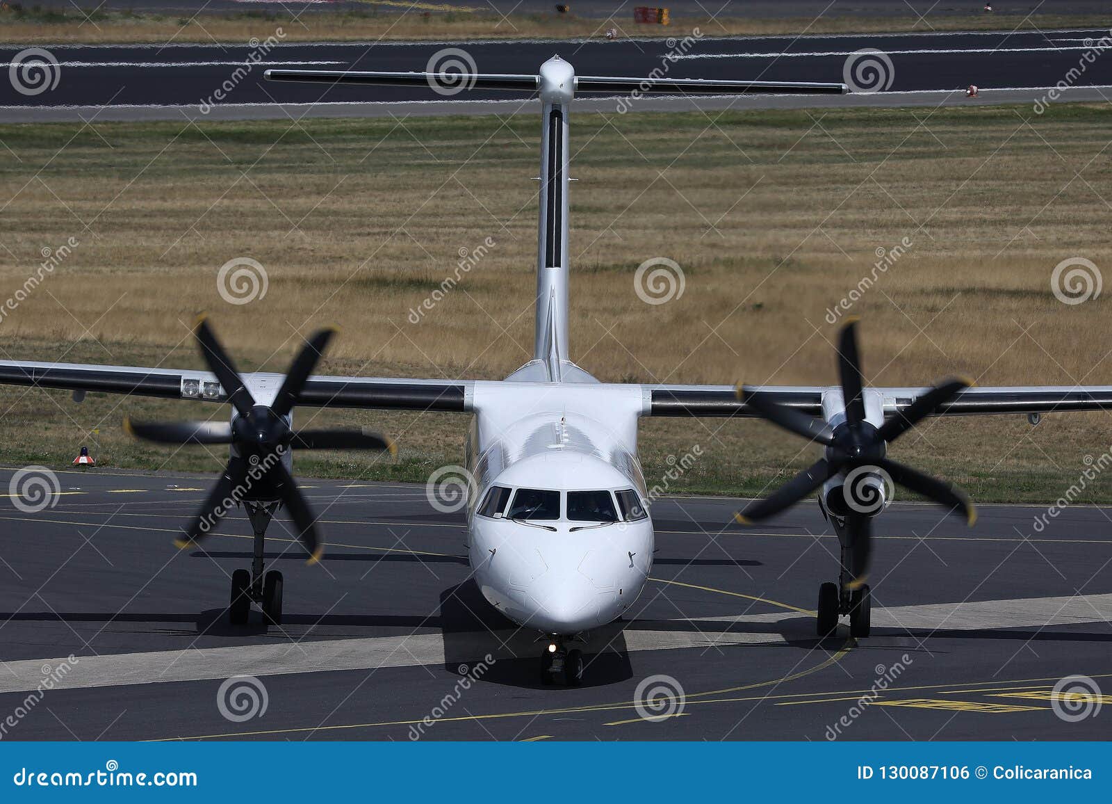 Small Jet on the Runway, Front Close-up View Stock Photo - Image of ...