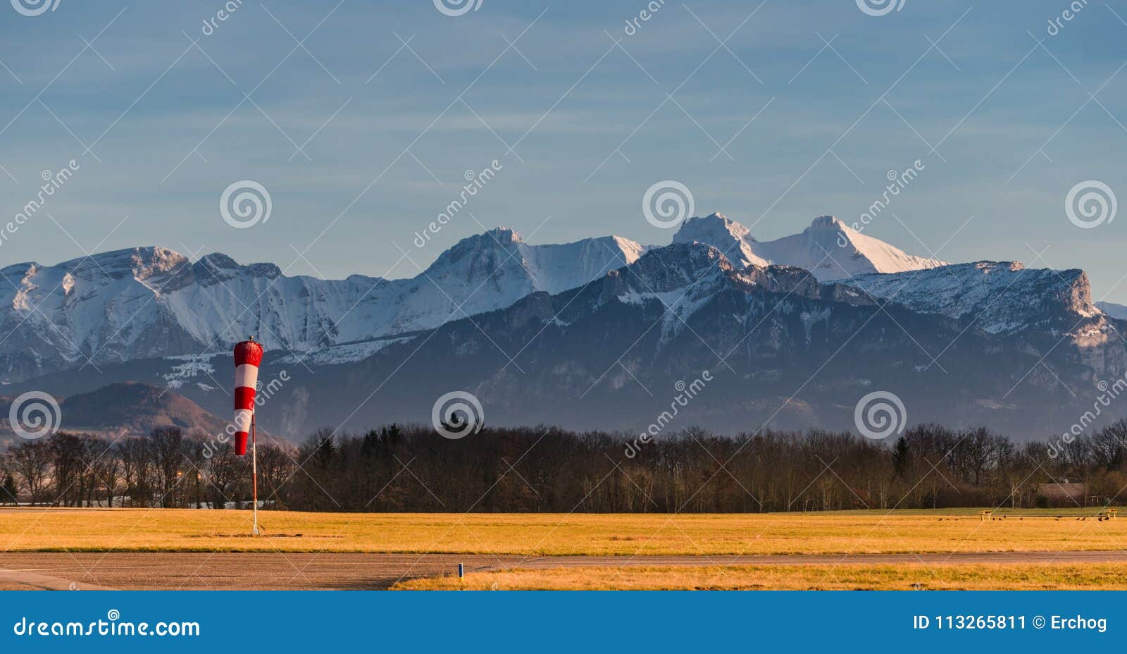 Small Airfield in Front of Mountain Top. Sunset Over Mountains. Stock ...