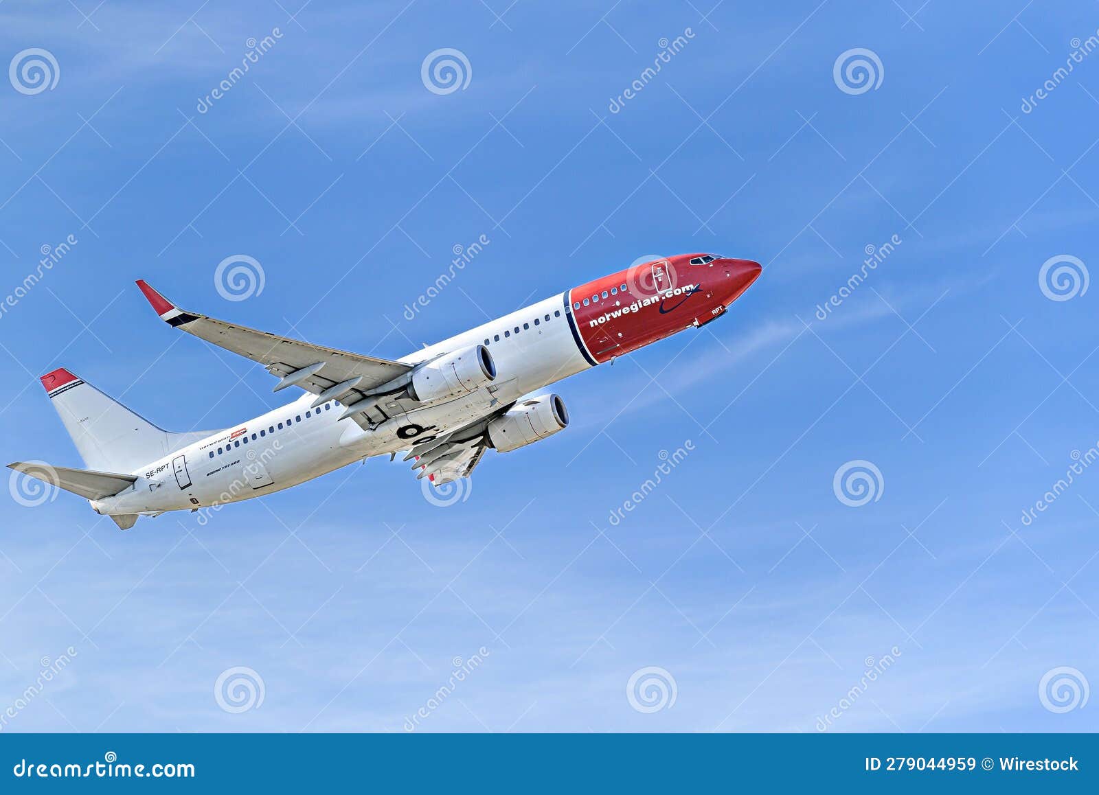 Small Airplane Flying in a Cloudy Blue Sky Editorial Stock Image ...