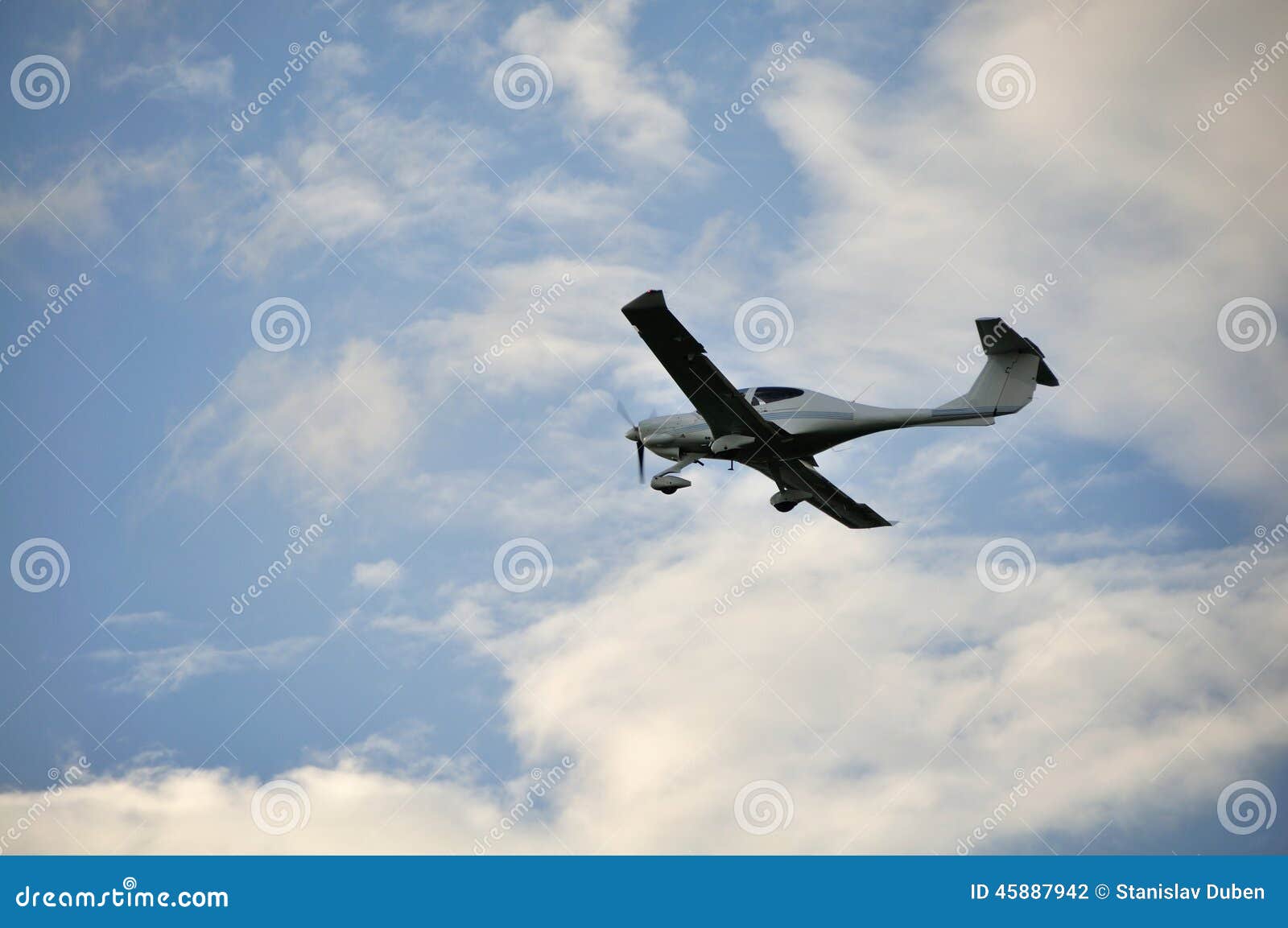 Small Airplane Flying on Cloudy Sky Stock Photo - Image of ...