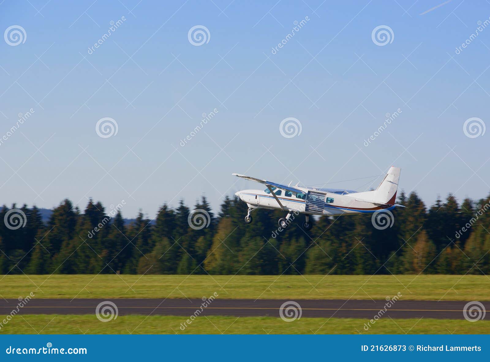 Small airplane lifting off stock image. Image of plane - 21626873