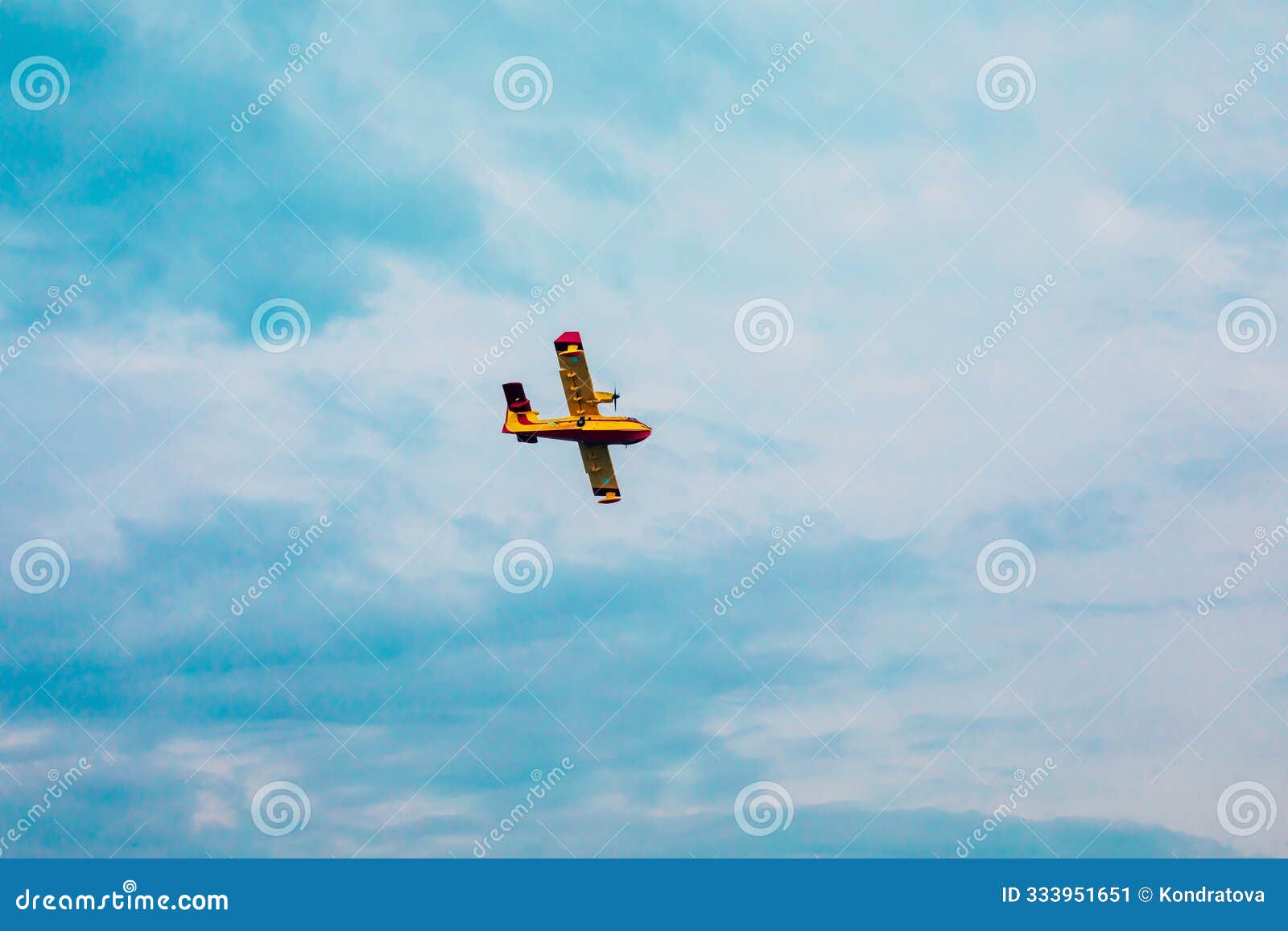 Small Airplane. Yellow Red Propeller Plane is Flying on Blue Sky Stock ...