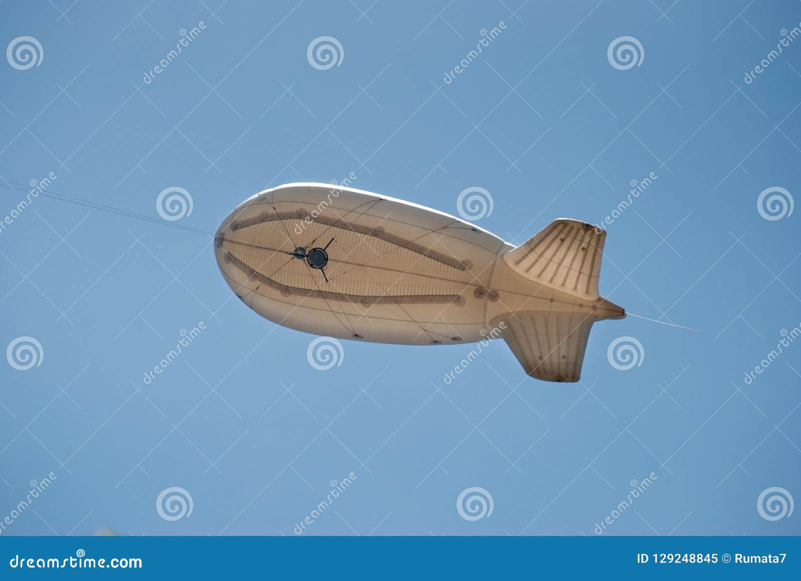 Small Airship Flying in Blue Sky Stock Image - Image of camera, small ...