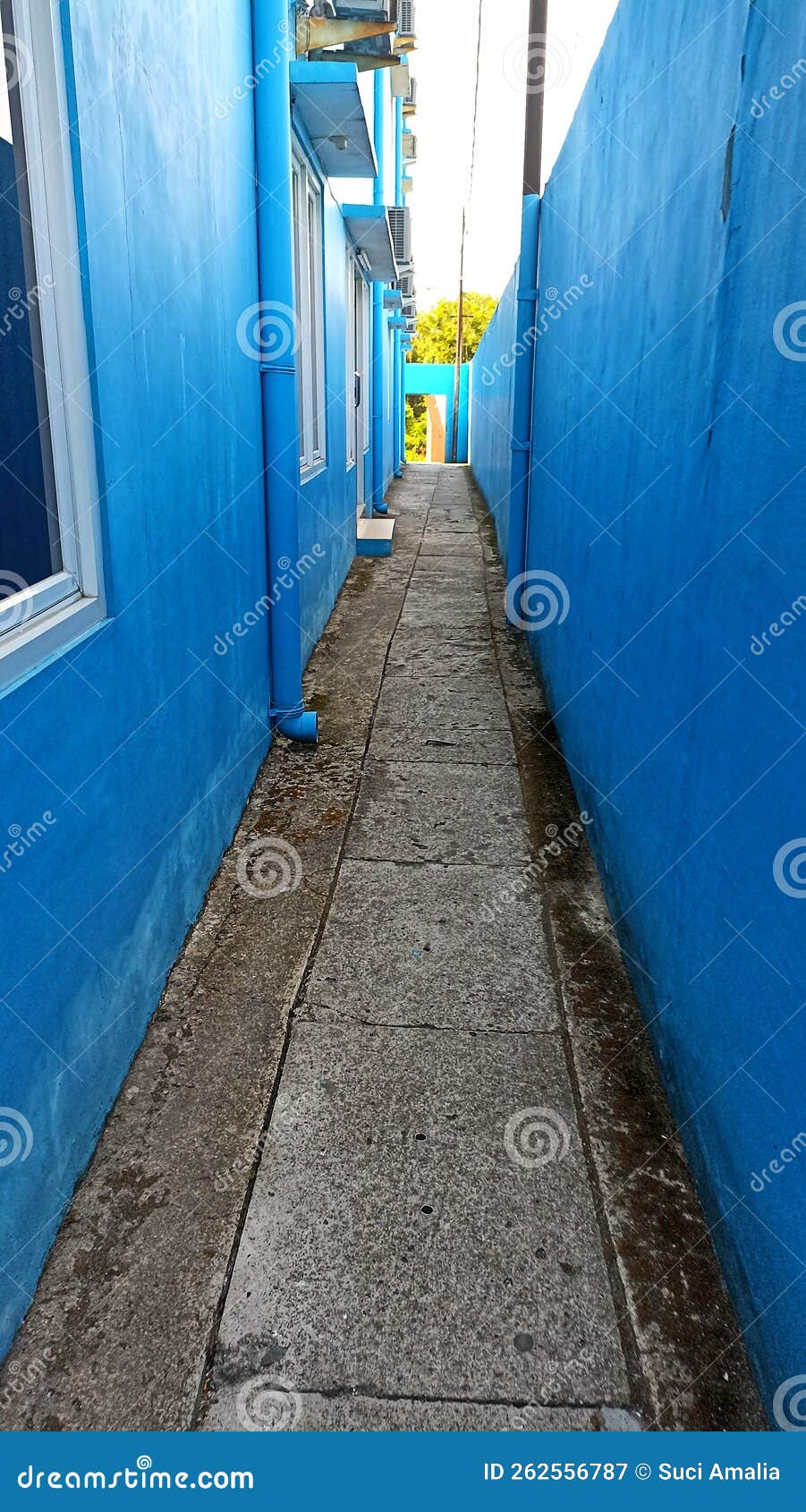 Small Alley with Blue Walls Stock Image - Image of stone, alley: 262556787