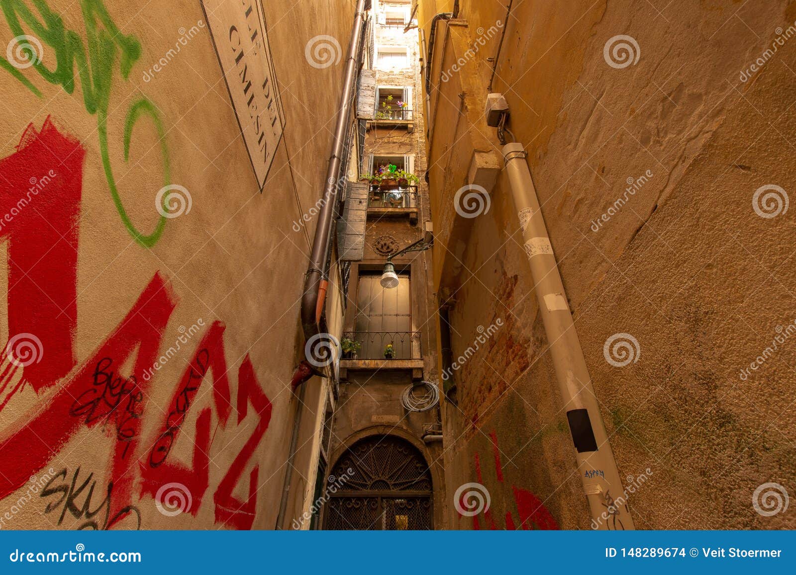 Small alley in Venice stock photo. Image of destination - 148289674