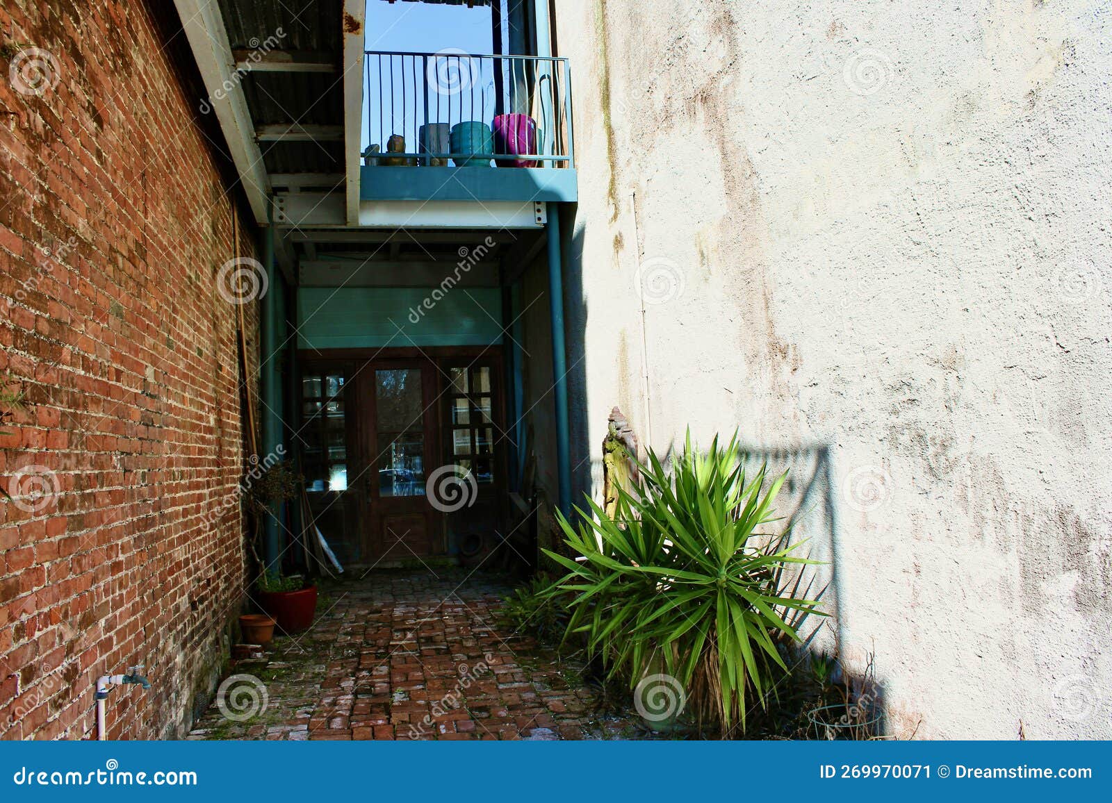 Small Alleyway Contrasting Old Brick To Parged Concrete Wall ...