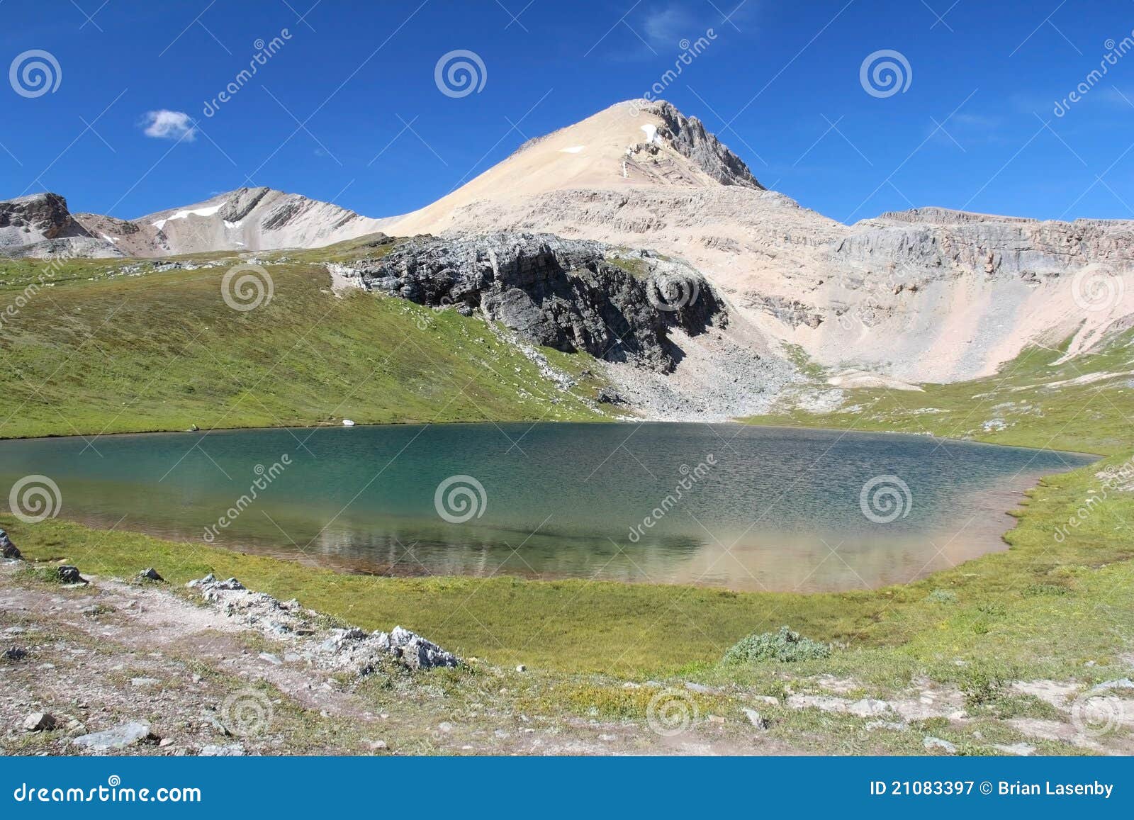 Small Alpine Lake with Mountain in Background Stock Image - Image of ...