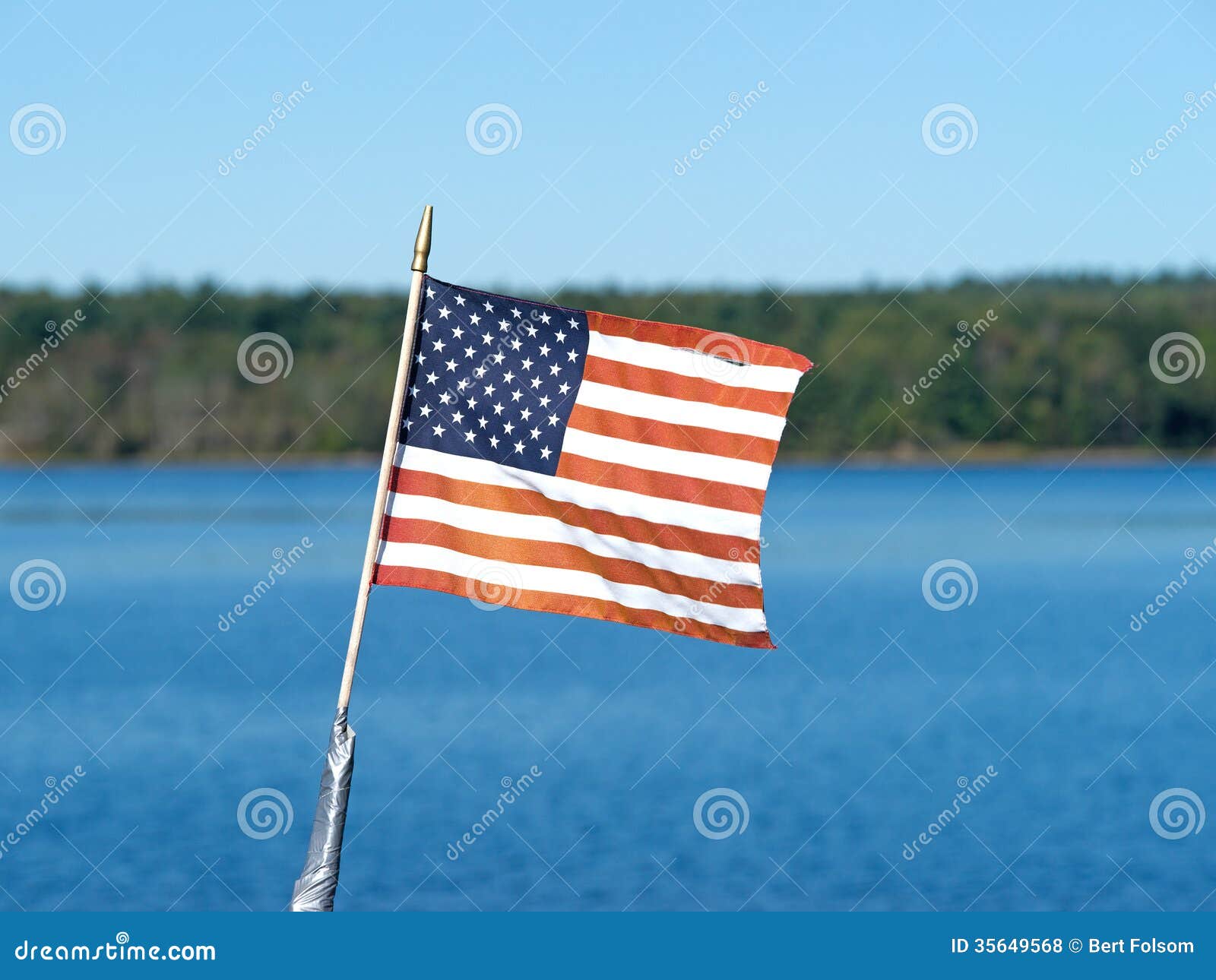 Small American Flag With Ocean And Shore Stock Photo - Image of flag ...