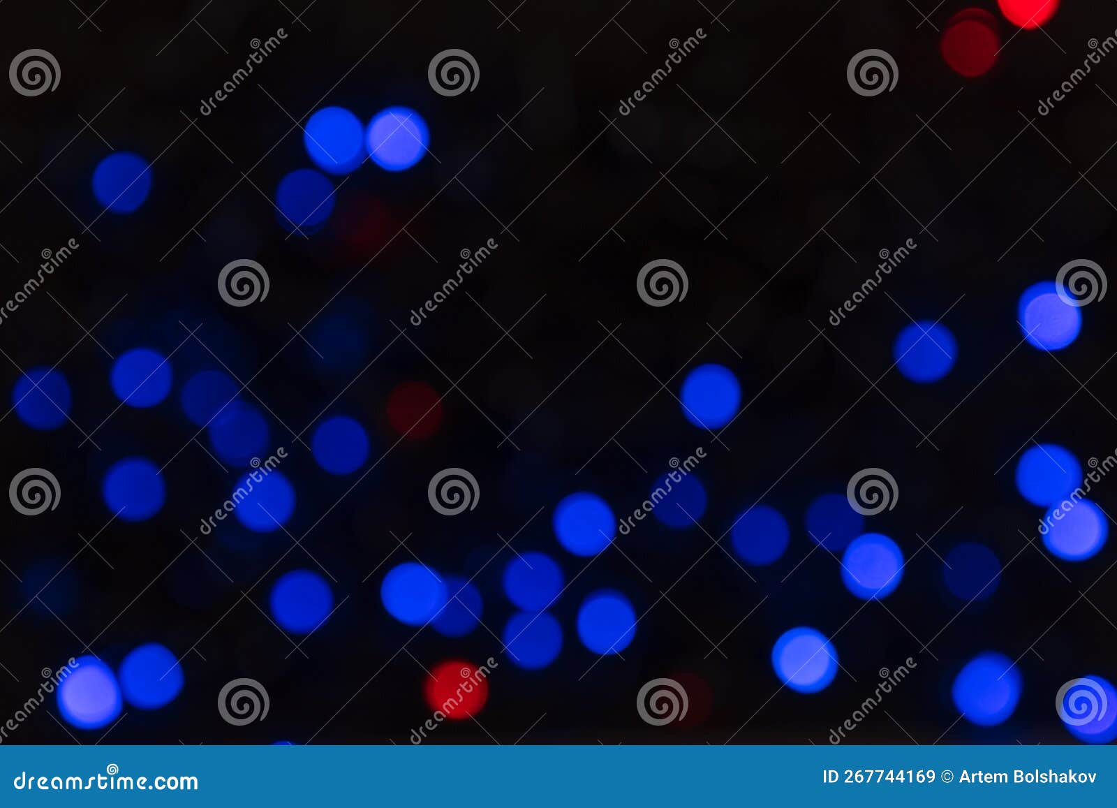 A Small Amount of Blue and Very Rare Red Light Confetti on a Black ...