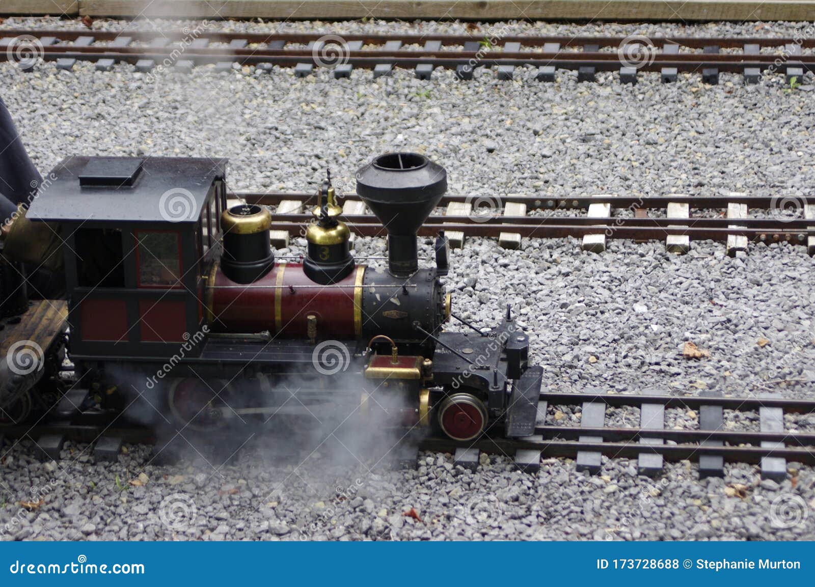 Small Antique Steam Train Engine on Tracks Stock Photo - Image of ...
