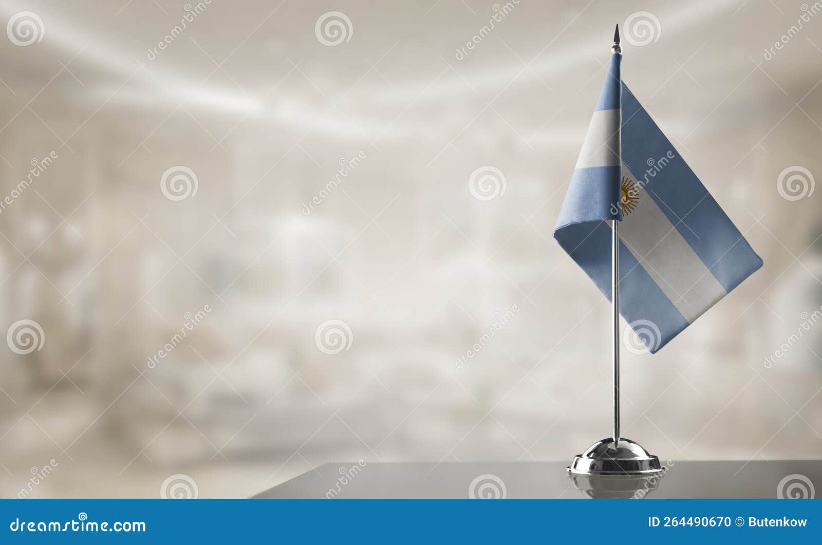 A Small Argentina Flag on an Abstract Blurry Background Stock Photo ...
