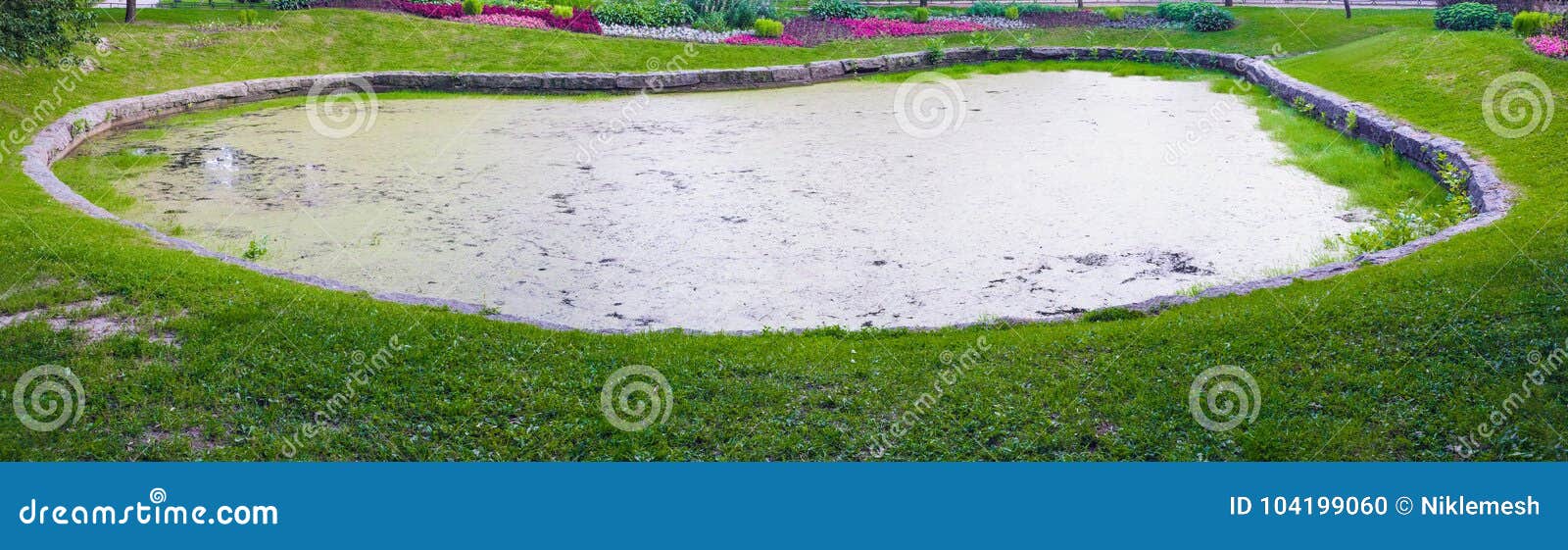 Small Artificial Ornamental Pond in a Stone Frame Stock Photo - Image ...