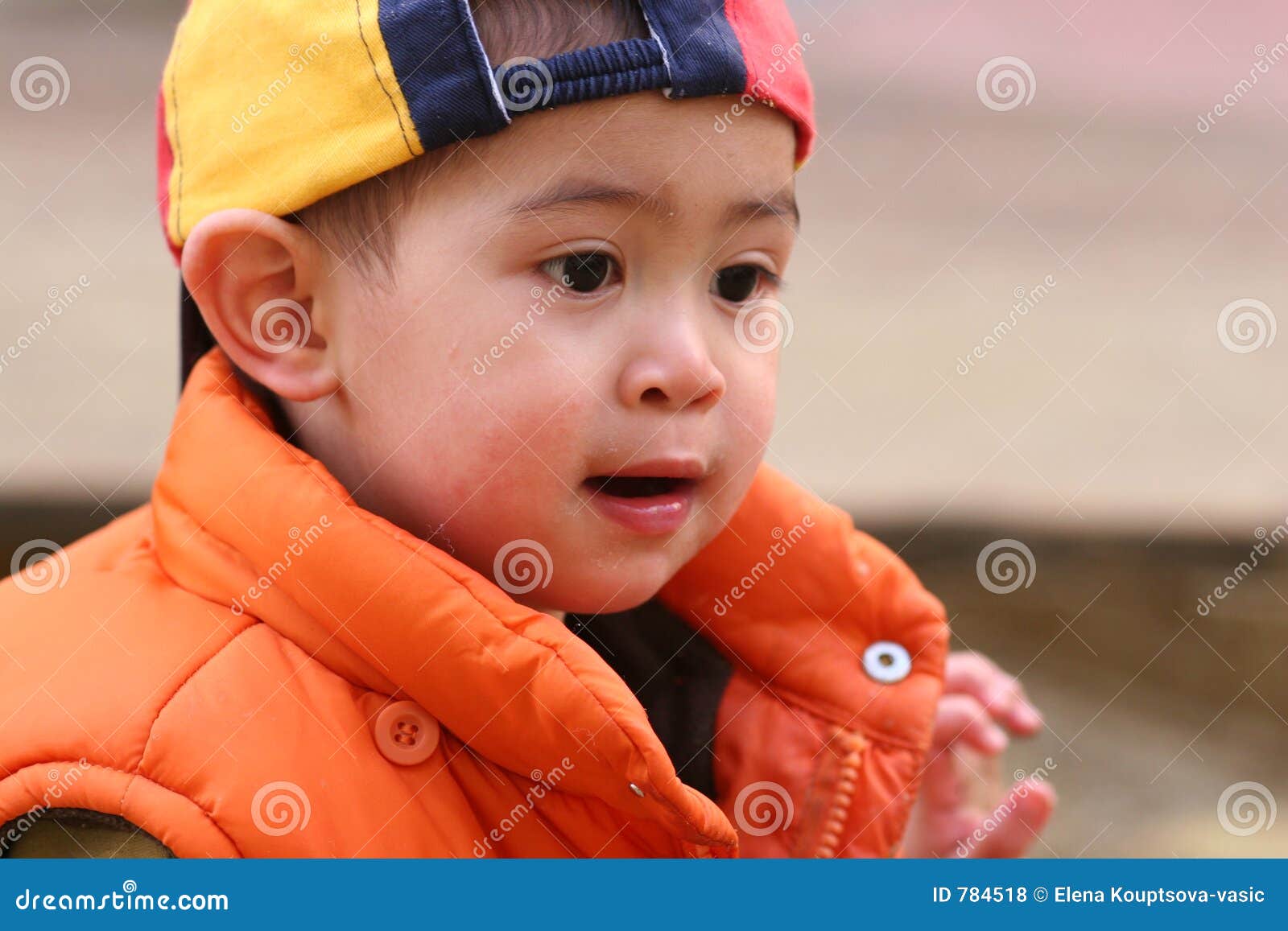 A Small Asian Girl Is Sitting On Field Of Forget Me Not Blue Flowers ...