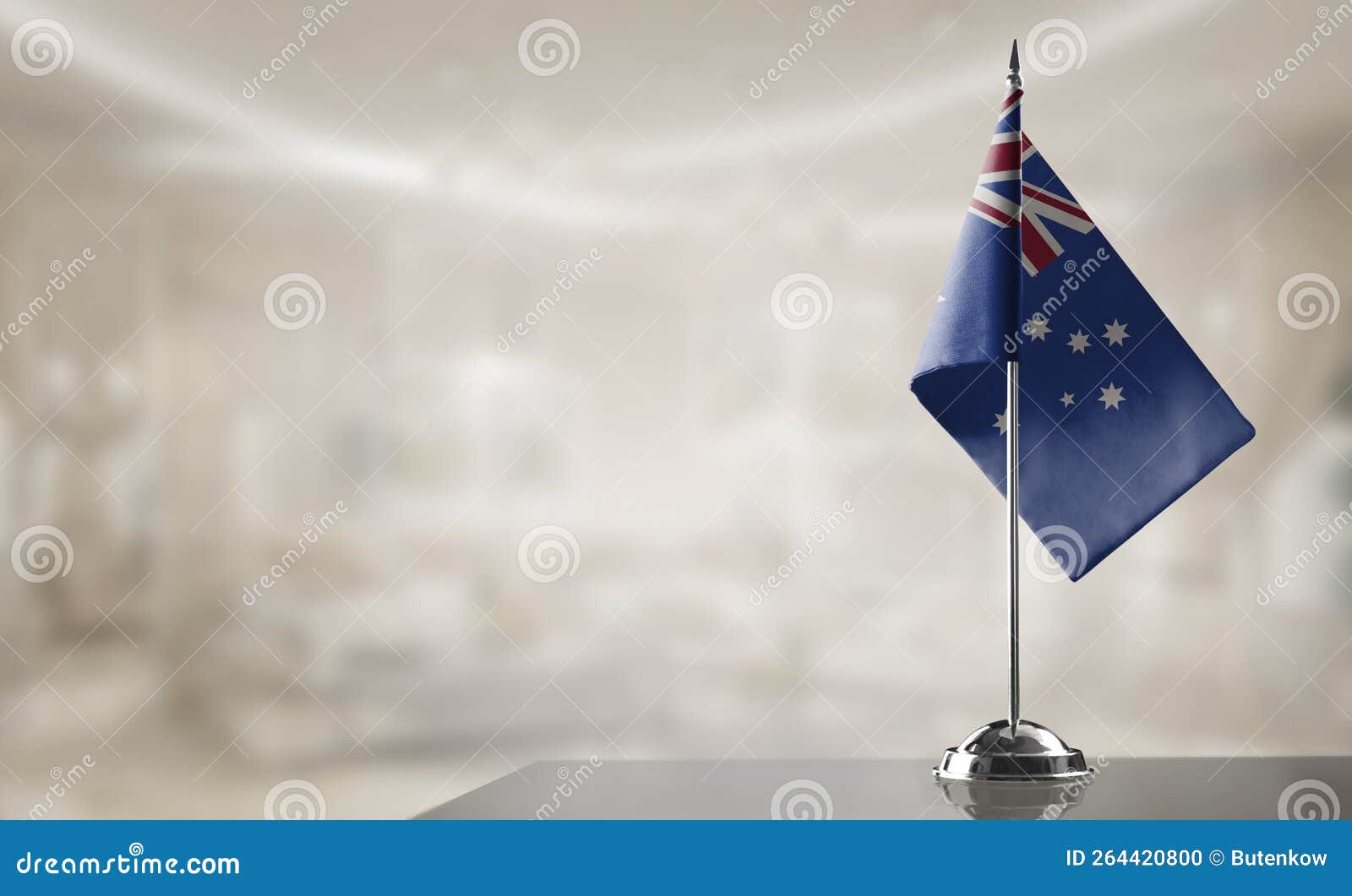 A Small Australia Flag on an Abstract Blurry Background Stock Photo ...
