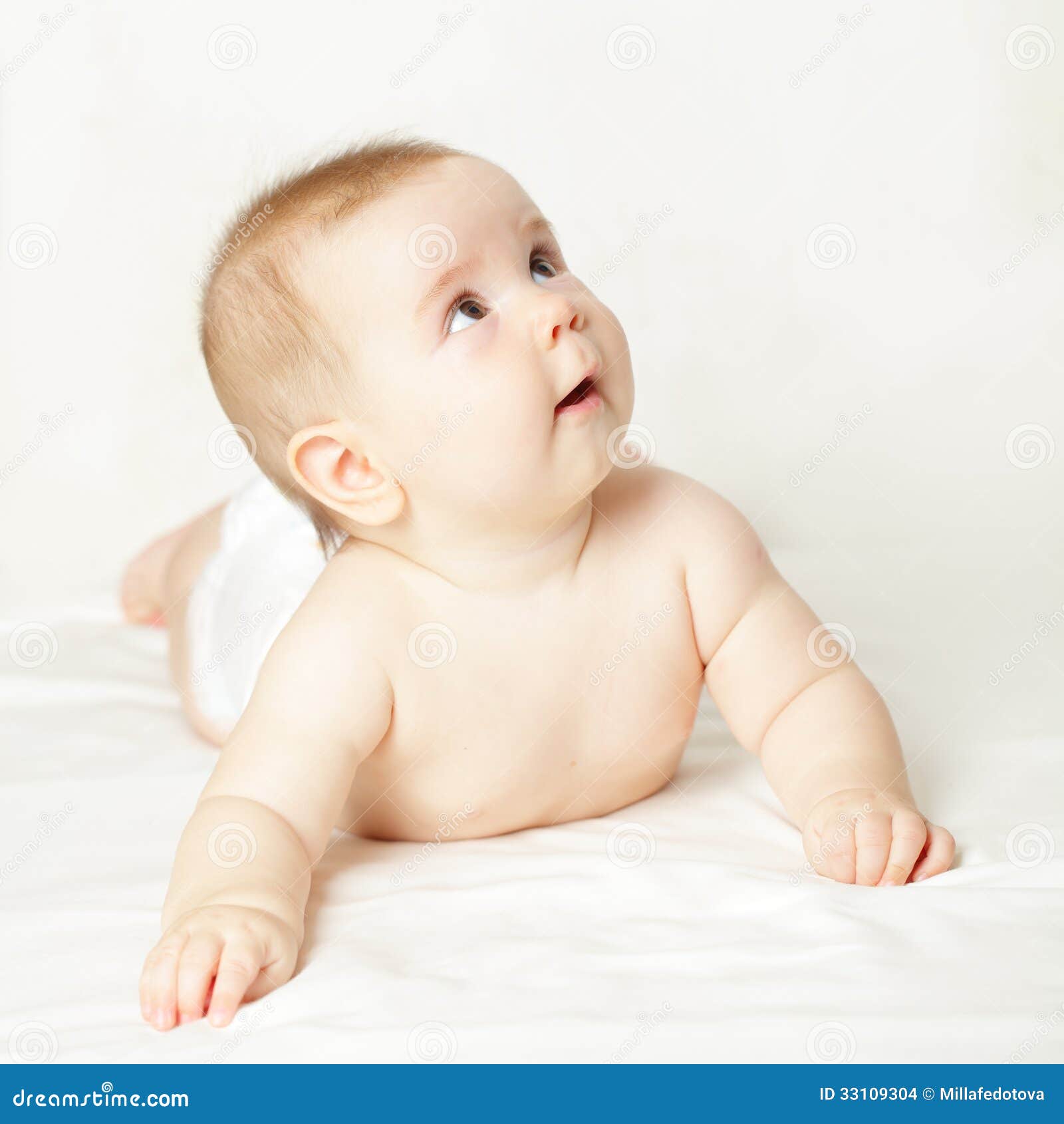 Small baby looking up stock photo. Image of bathing, beautiful - 33109304
