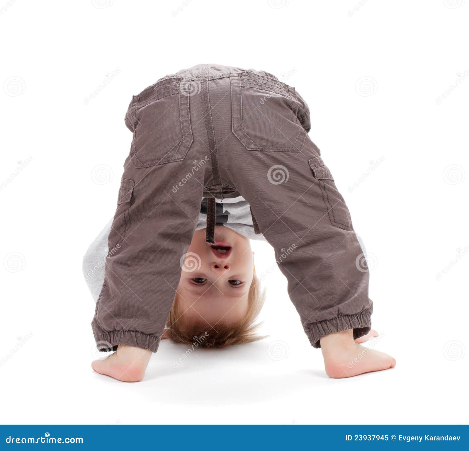 Small baby stands on head stock image. Image of cute - 23937945