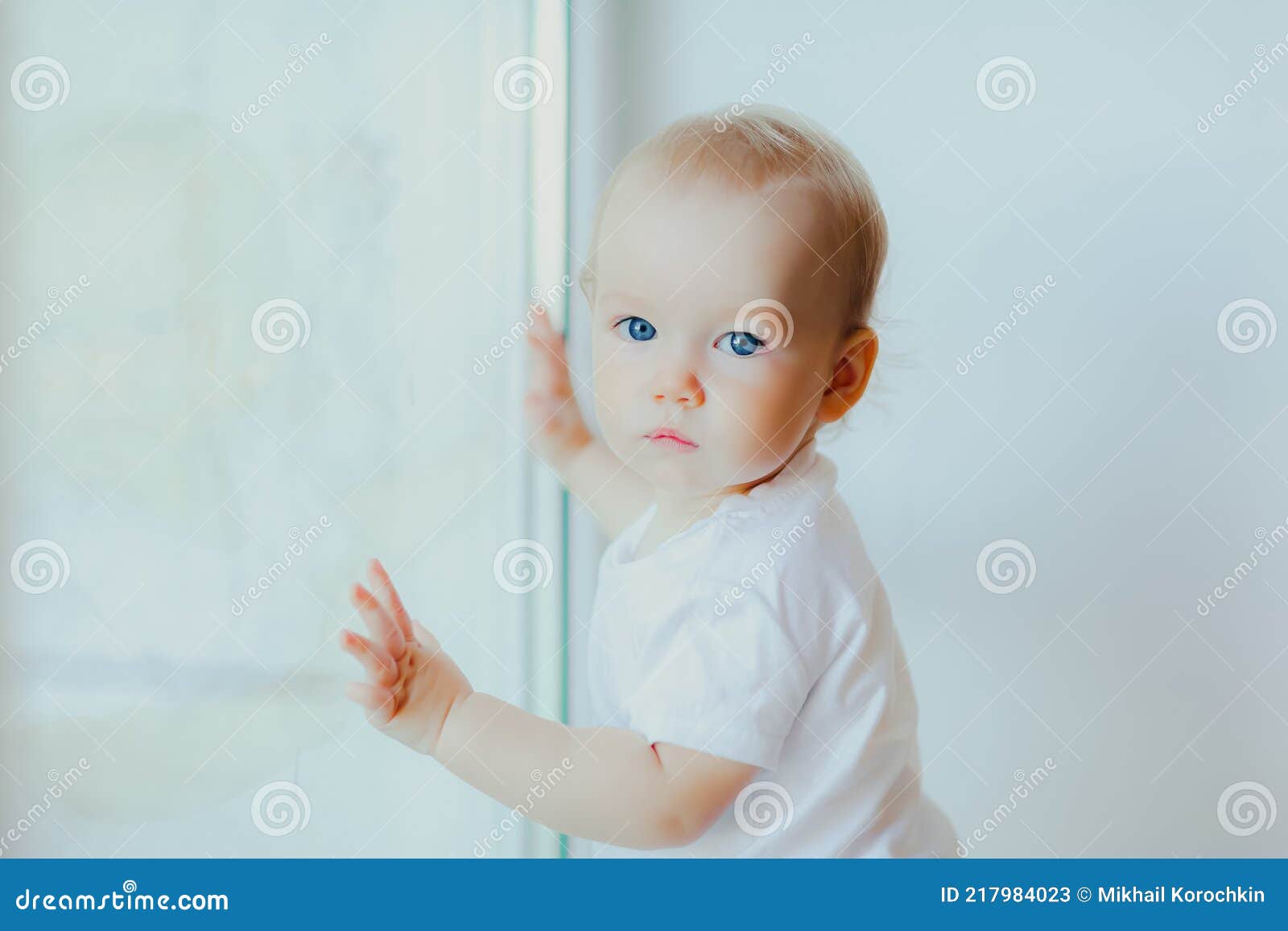 Small Baby Stands by Window Stock Image - Image of indoors, infant ...