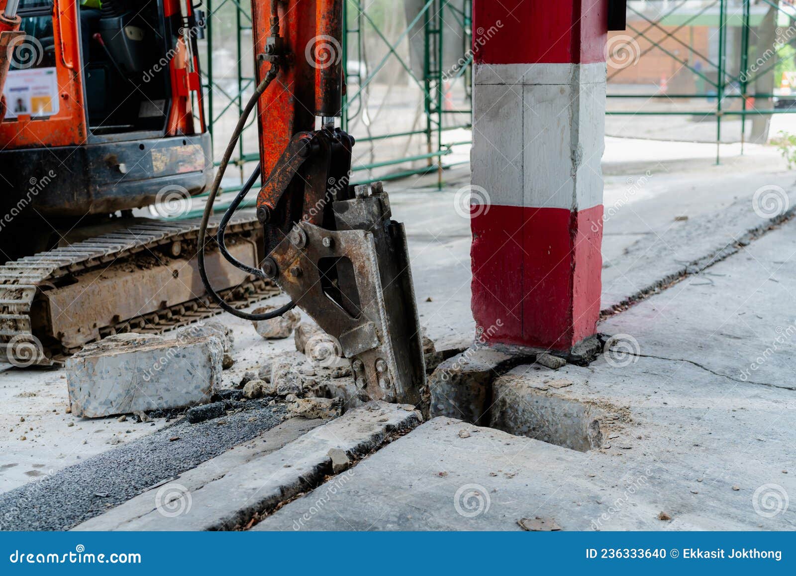 Small Backhoe Robot Use a Pointed Forearm., To Drill Concrete Slabs ...