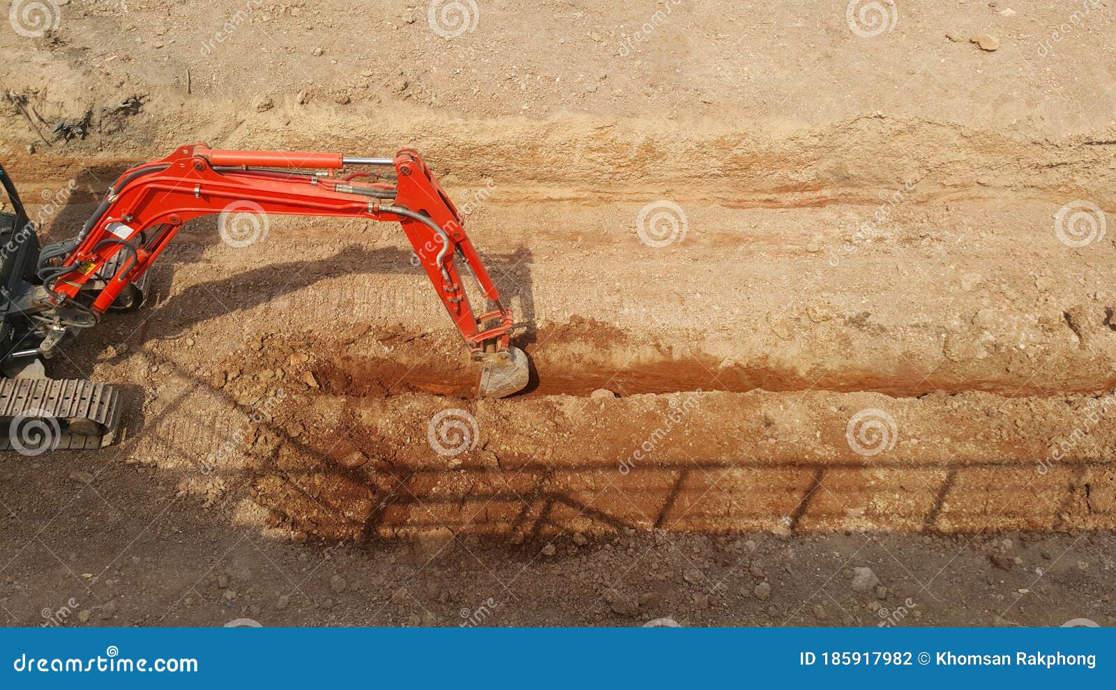 Small Backhoe is Working Digging Down the Ground Stock Photo - Image of ...