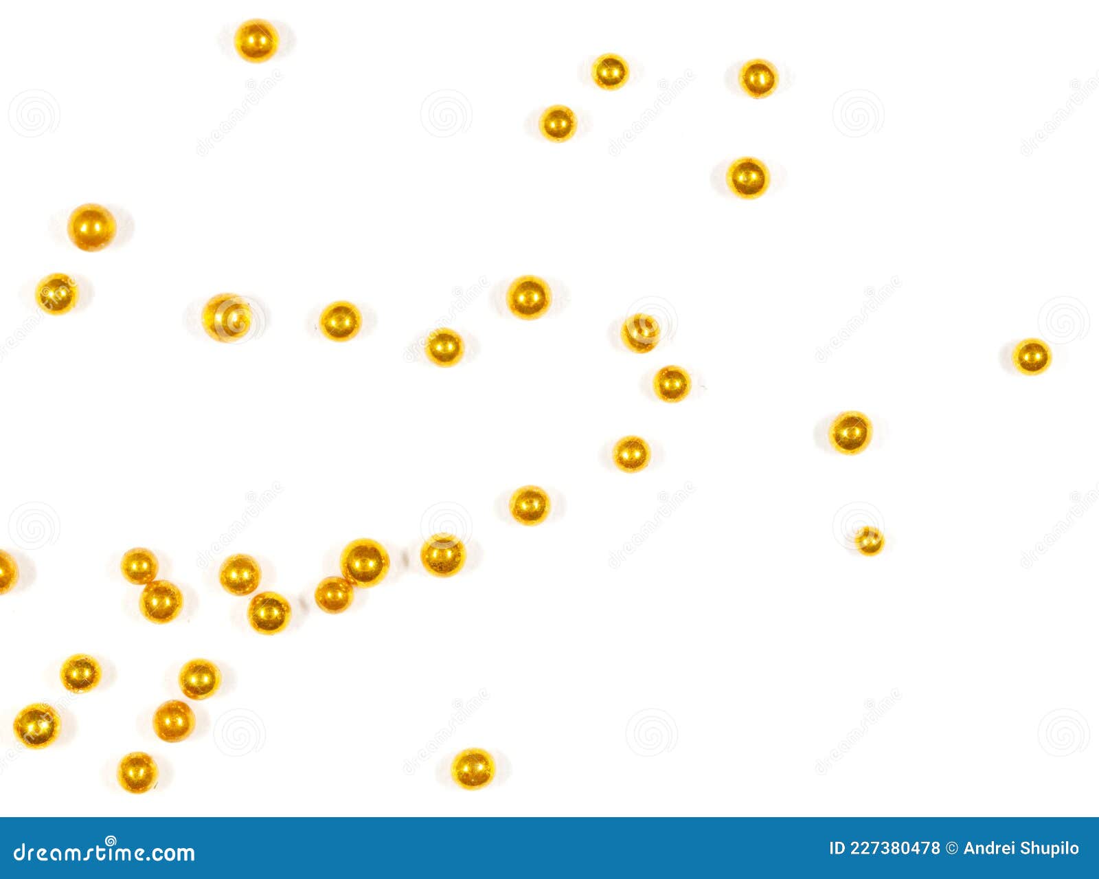 Small Balls of Gold on a White Background. Stock Photo - Image of ...