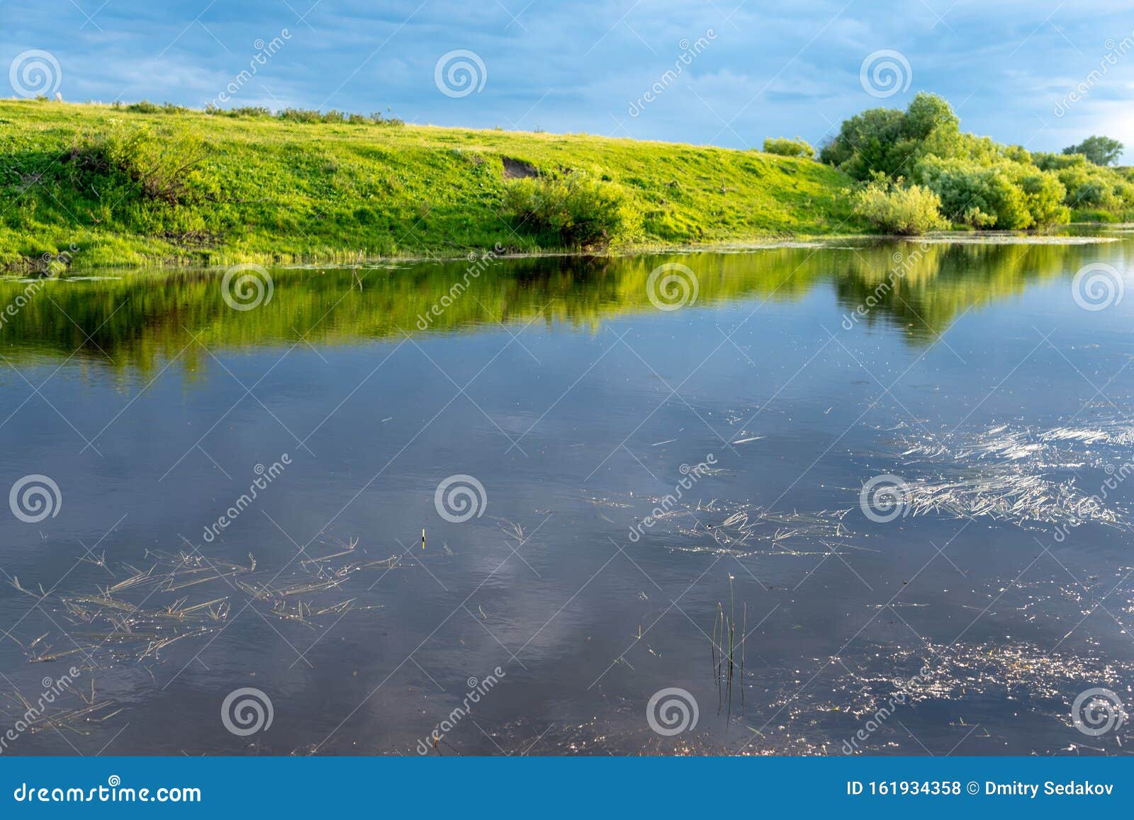 A Small Barely Noticeable Float Stands in the Water among the ...