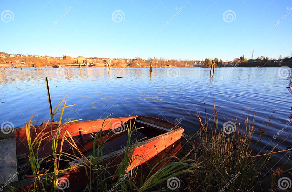 Small barge in the lake. stock photo. Image of sunset - 19004892