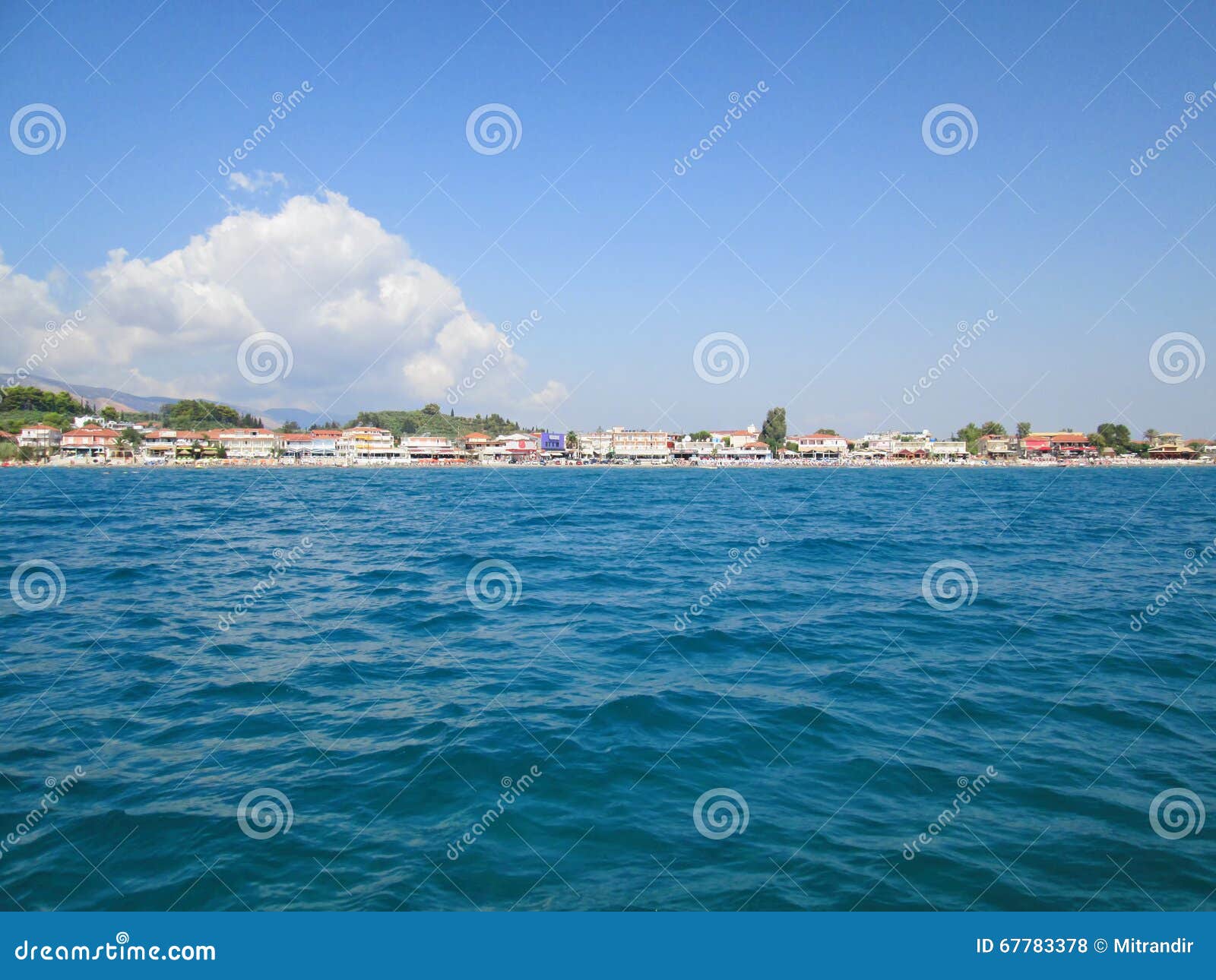 Small beachside town stock photo. Image of town, mountain - 67783378