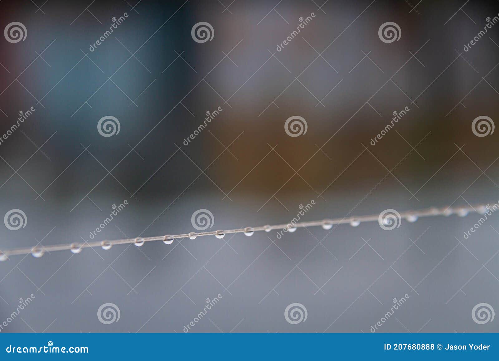 Small Beads of Water Drops on a String Fading Out of Focus Stock Photo ...