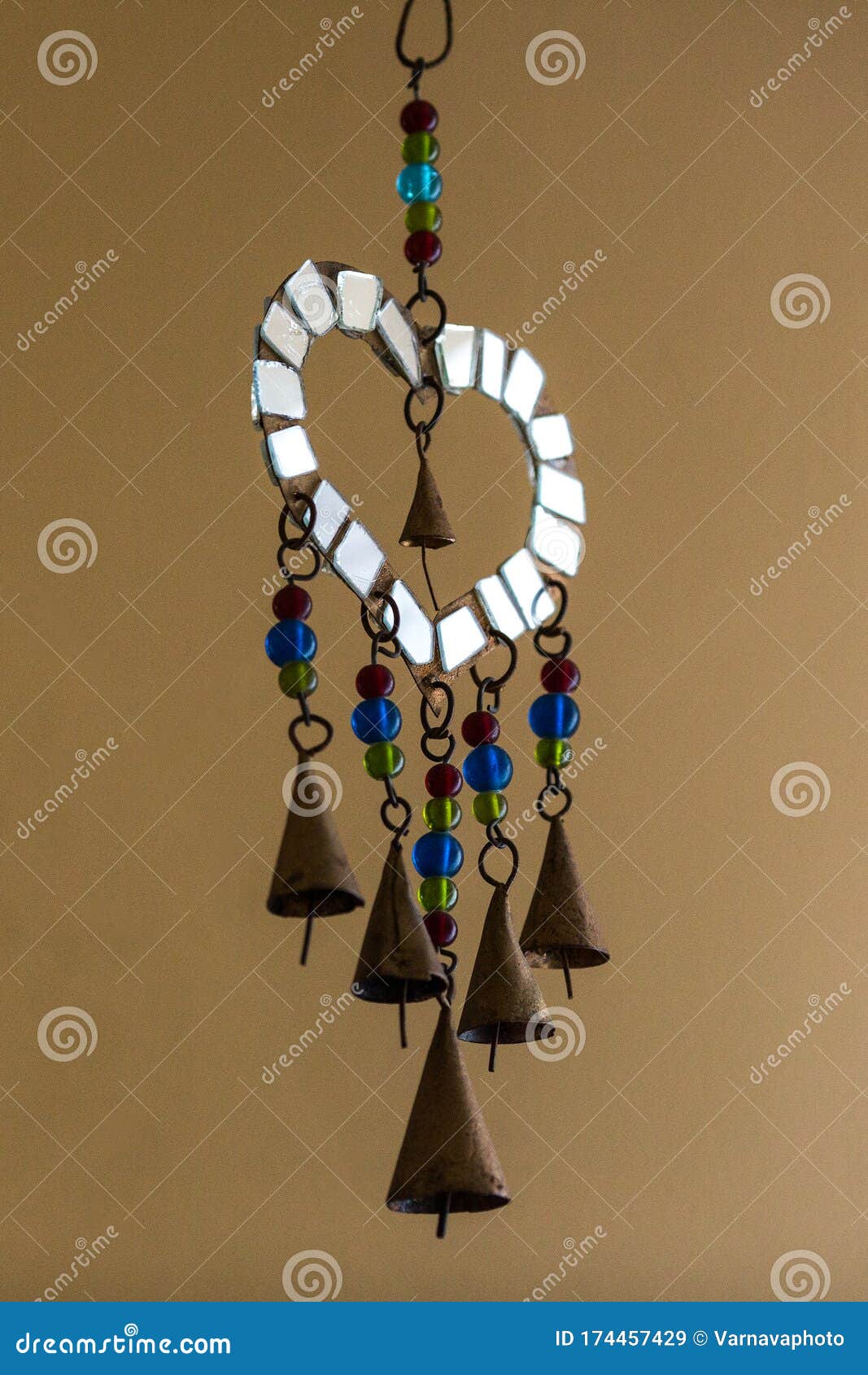 Small Bells on a Heart-shaped Suspension Stock Image - Image of bell ...