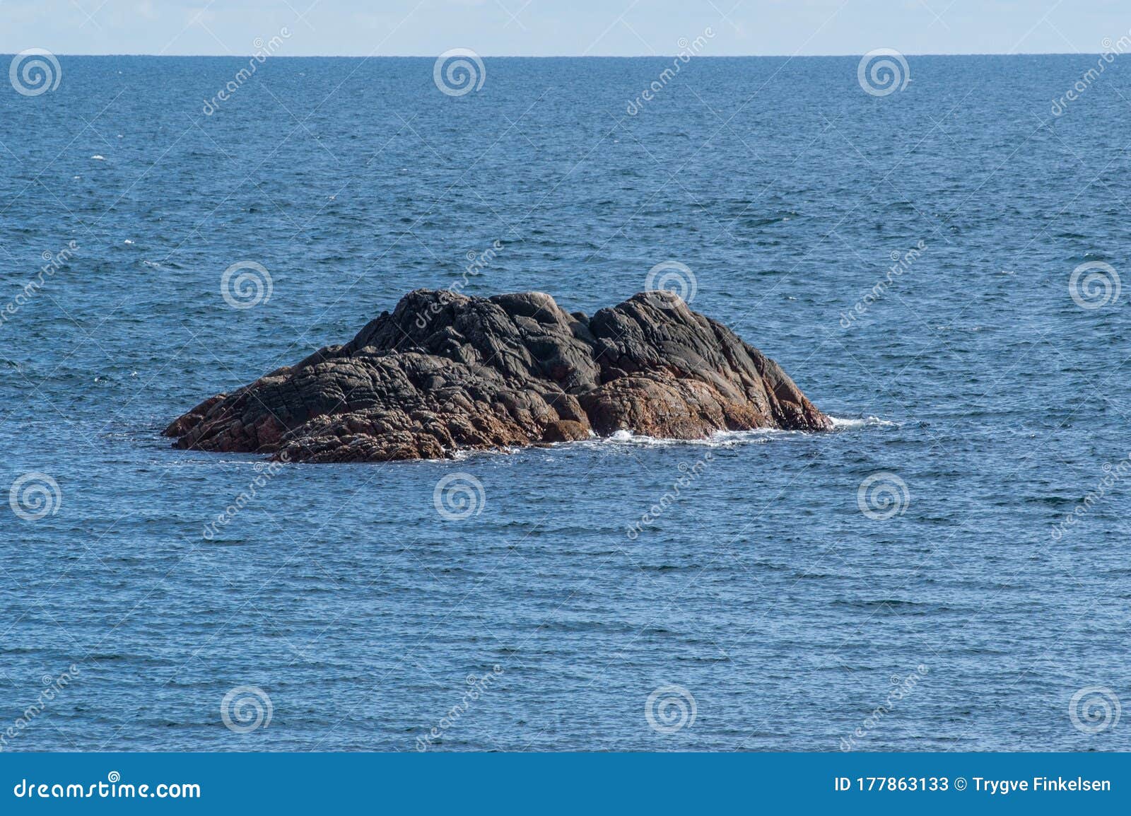 Small, Black Skerry in the Sea Stock Image - Image of rock, blue: 177863133
