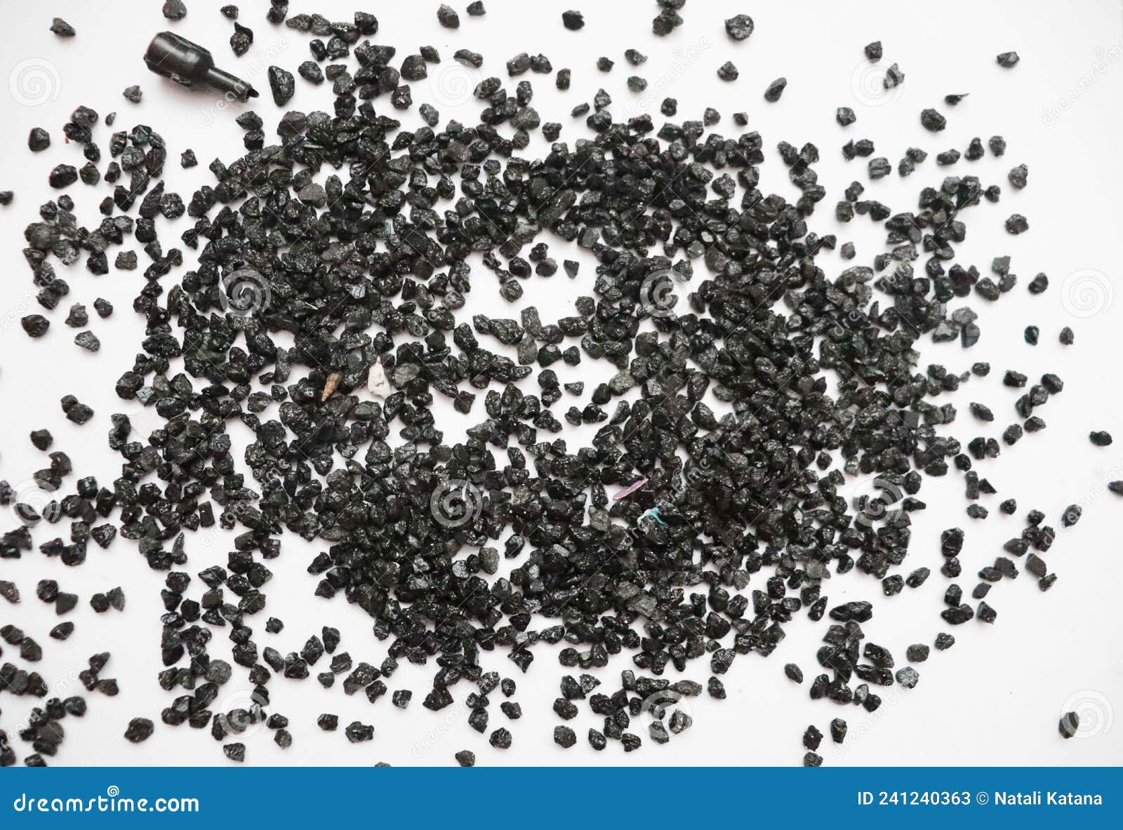 Small black stones stock image. Image of background - 241240363