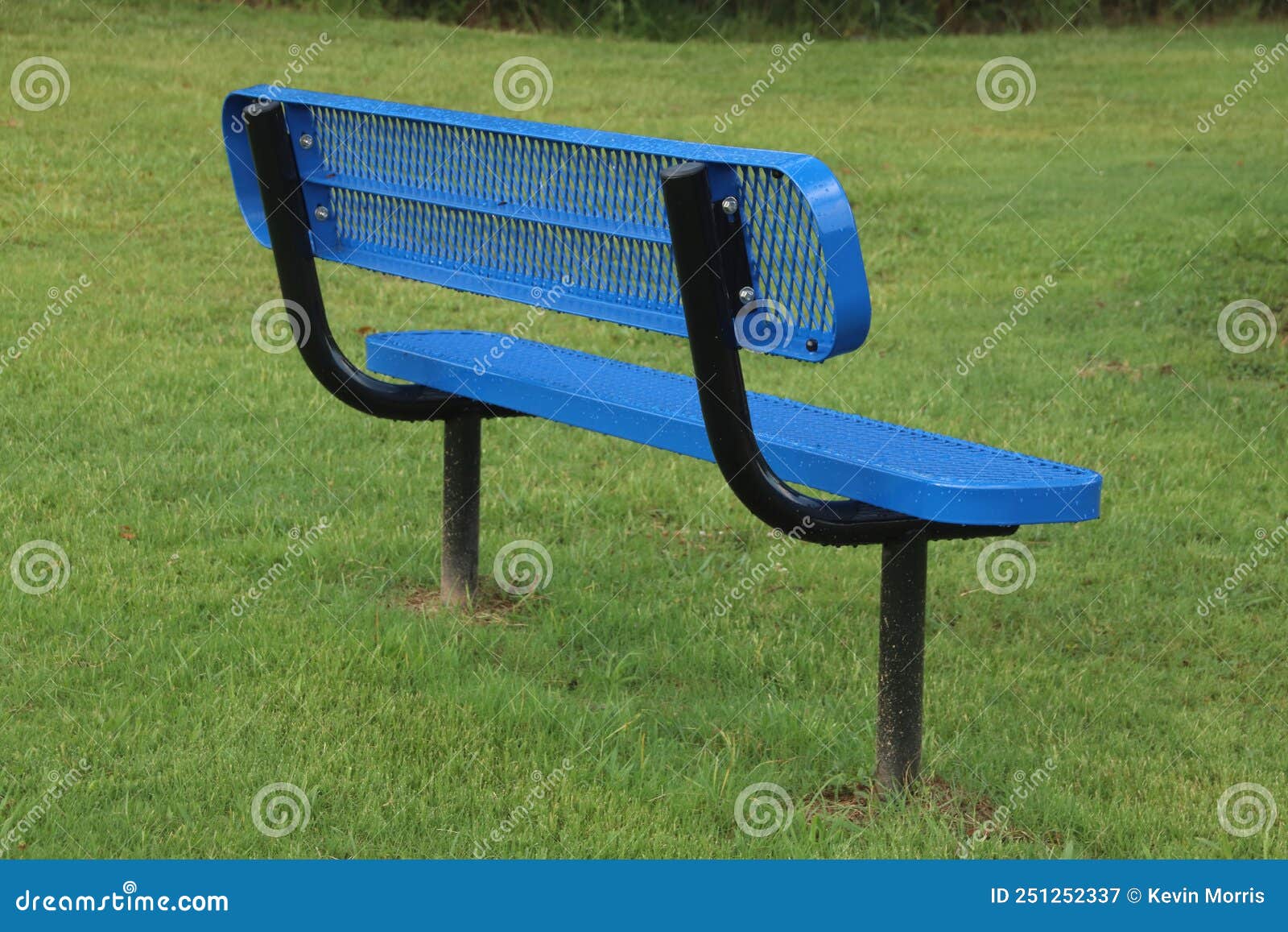 Small blue bench at a park stock image. Image of summer - 251252337