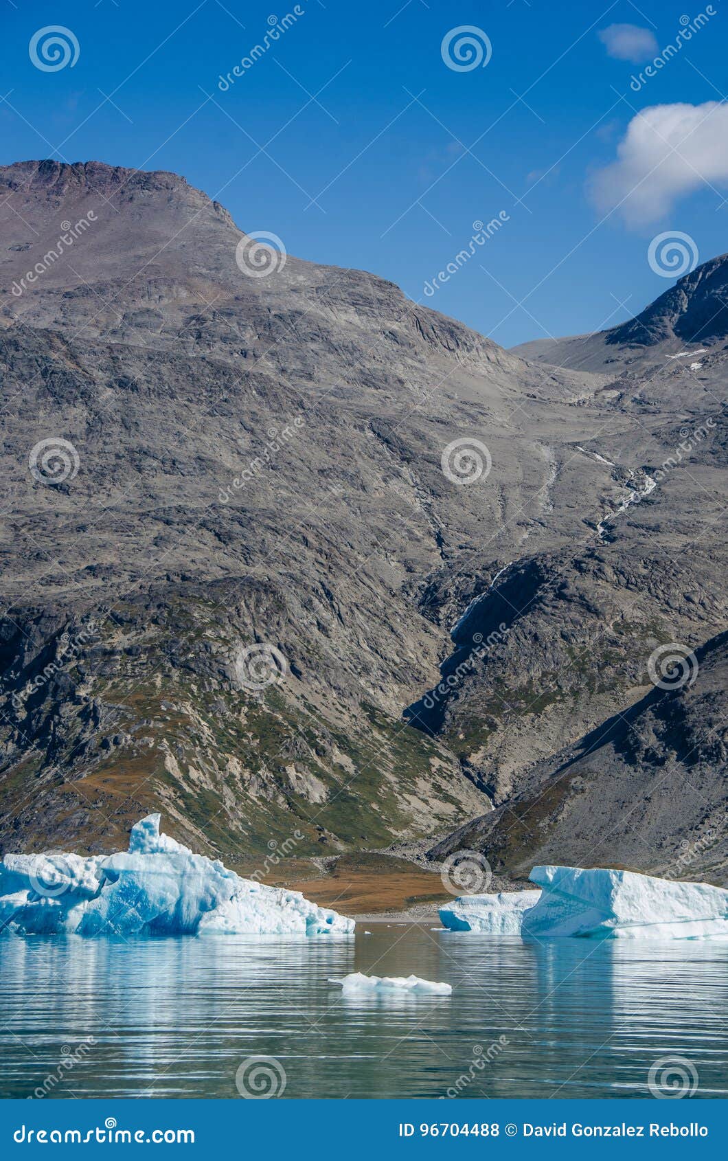 Small and Blue Iceberg Near the Coast Stock Photo - Image of hill ...