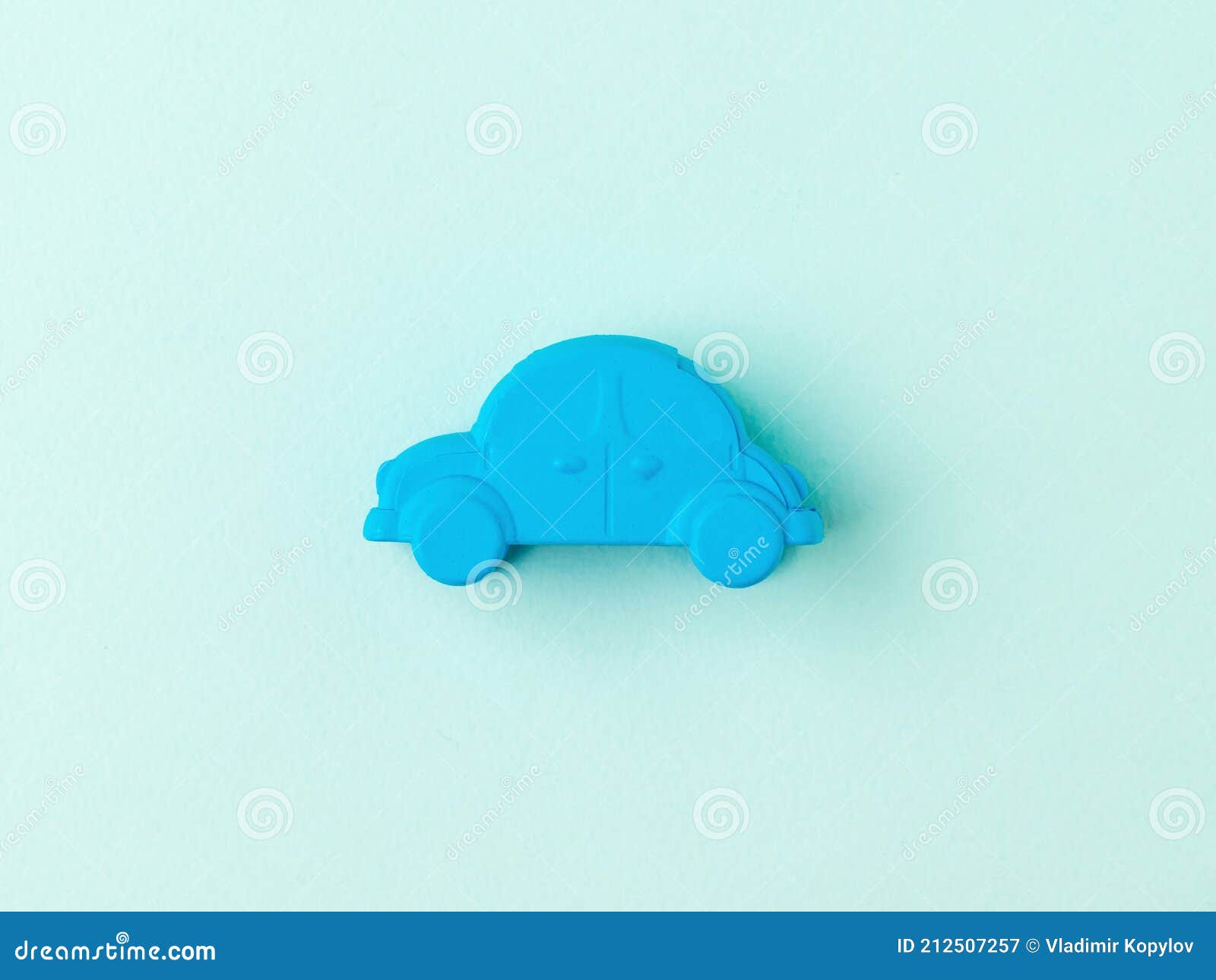 A Small Blue Toy Car on a Light Blue Background Stock Image - Image of ...