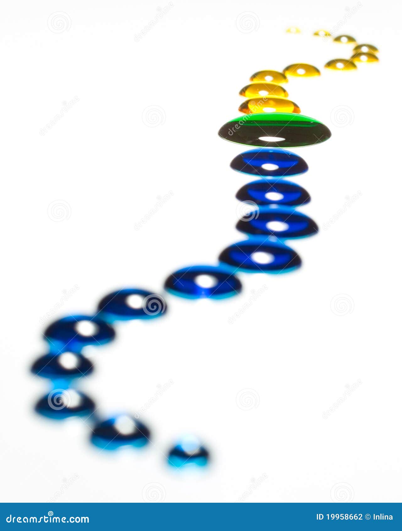 Small Blue and Yellow Drops with Large Green Drop Stock Photo - Image ...