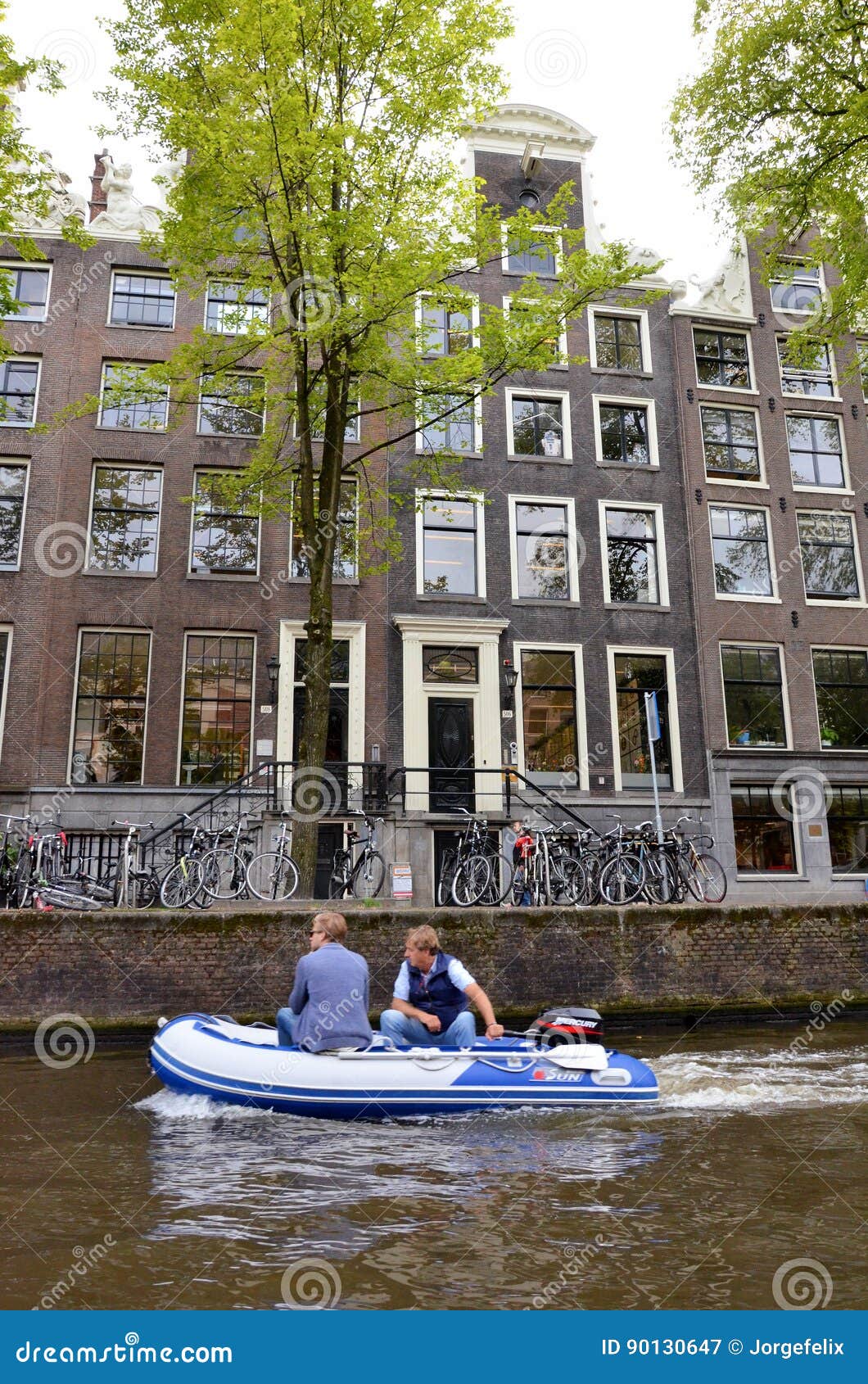 Small Boat in a Canal in Amsterdam Editorial Photography - Image of ...