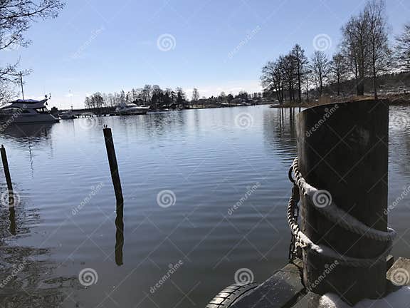 Small boat dock in winter stock image. Image of table - 142601597