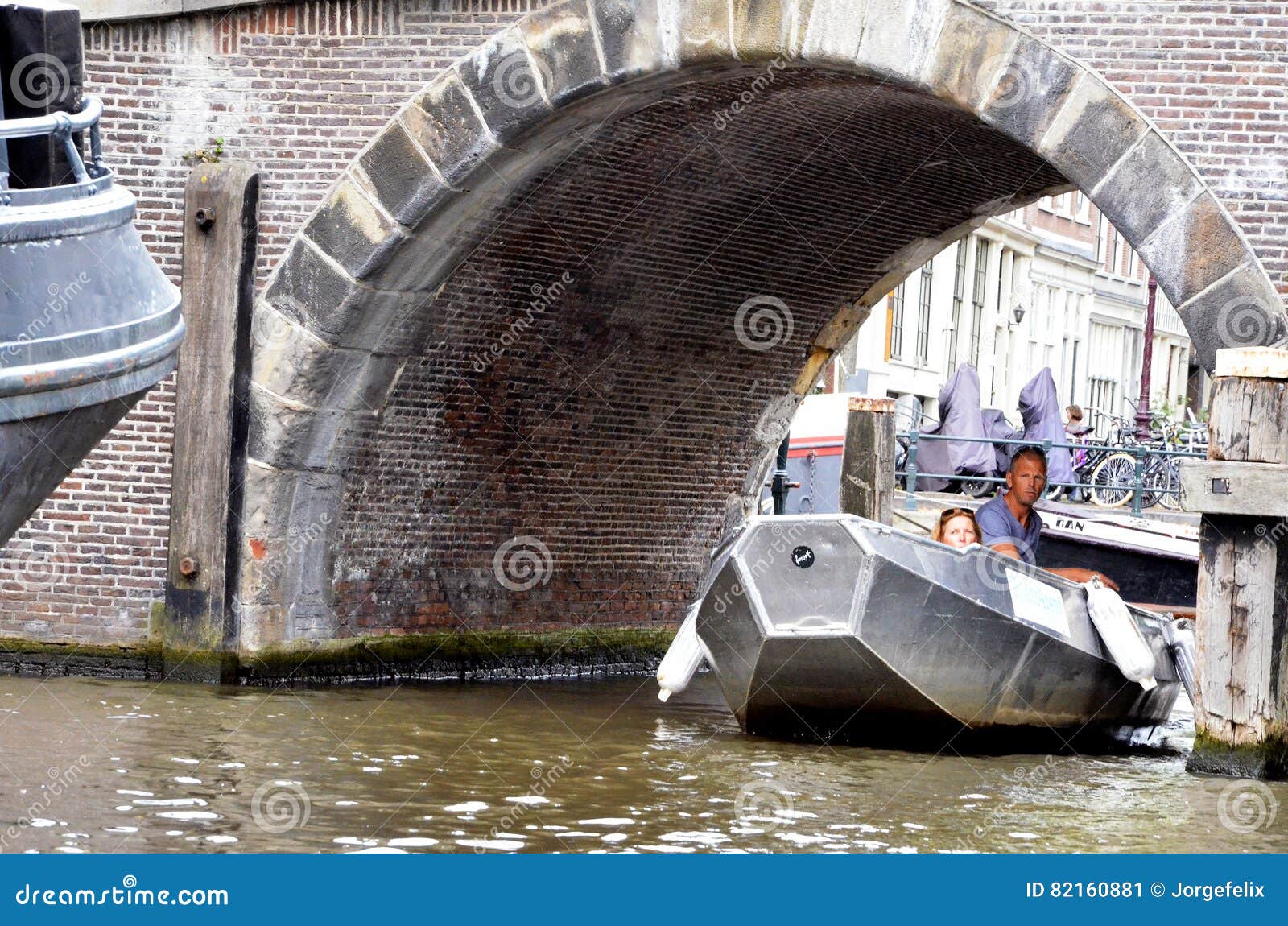 Small Boat Passing Under a Bridge Editorial Photo - Image of boat ...