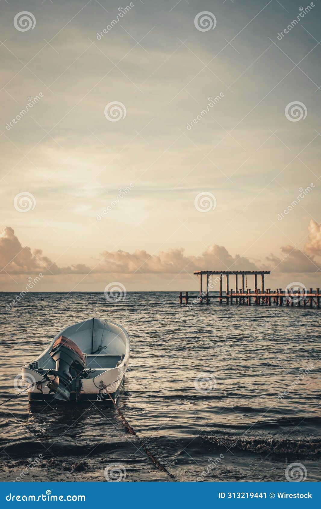 Small Boat by a Pier with a Long Bridge in the Ocean. Stock Image ...