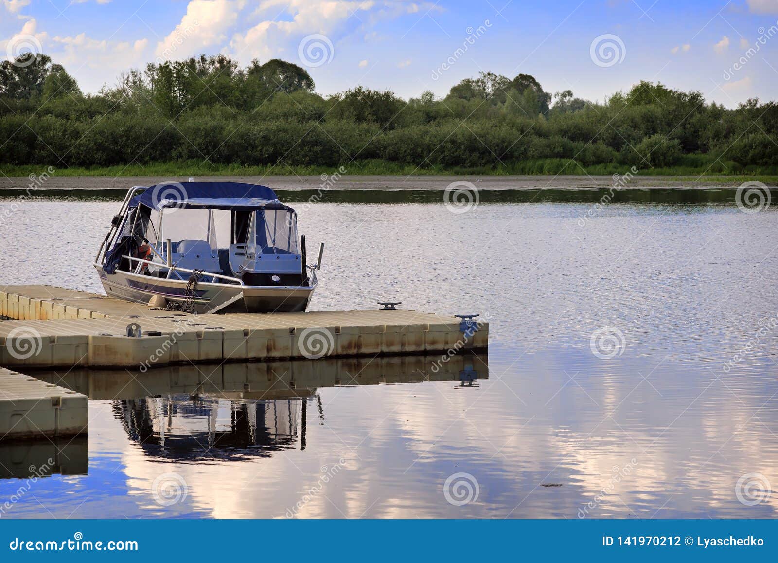 Small Boat at the Pier on the River. Stock Photo - Image of boating ...