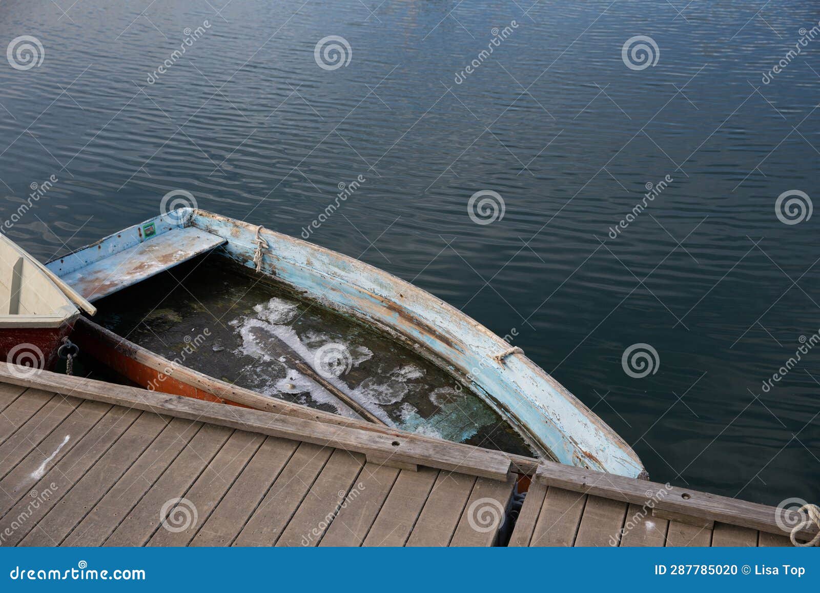 Small Boat Sinking stock photo. Image of water, wooden - 287785020