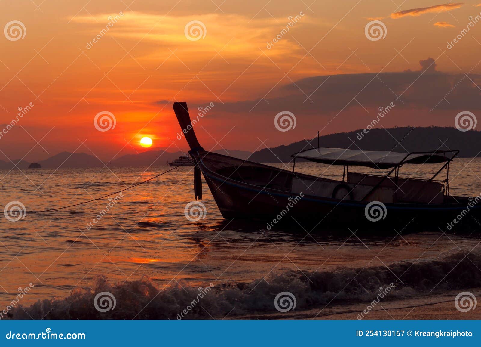 Small boat at sunset stock image. Image of sunset, light - 254130167