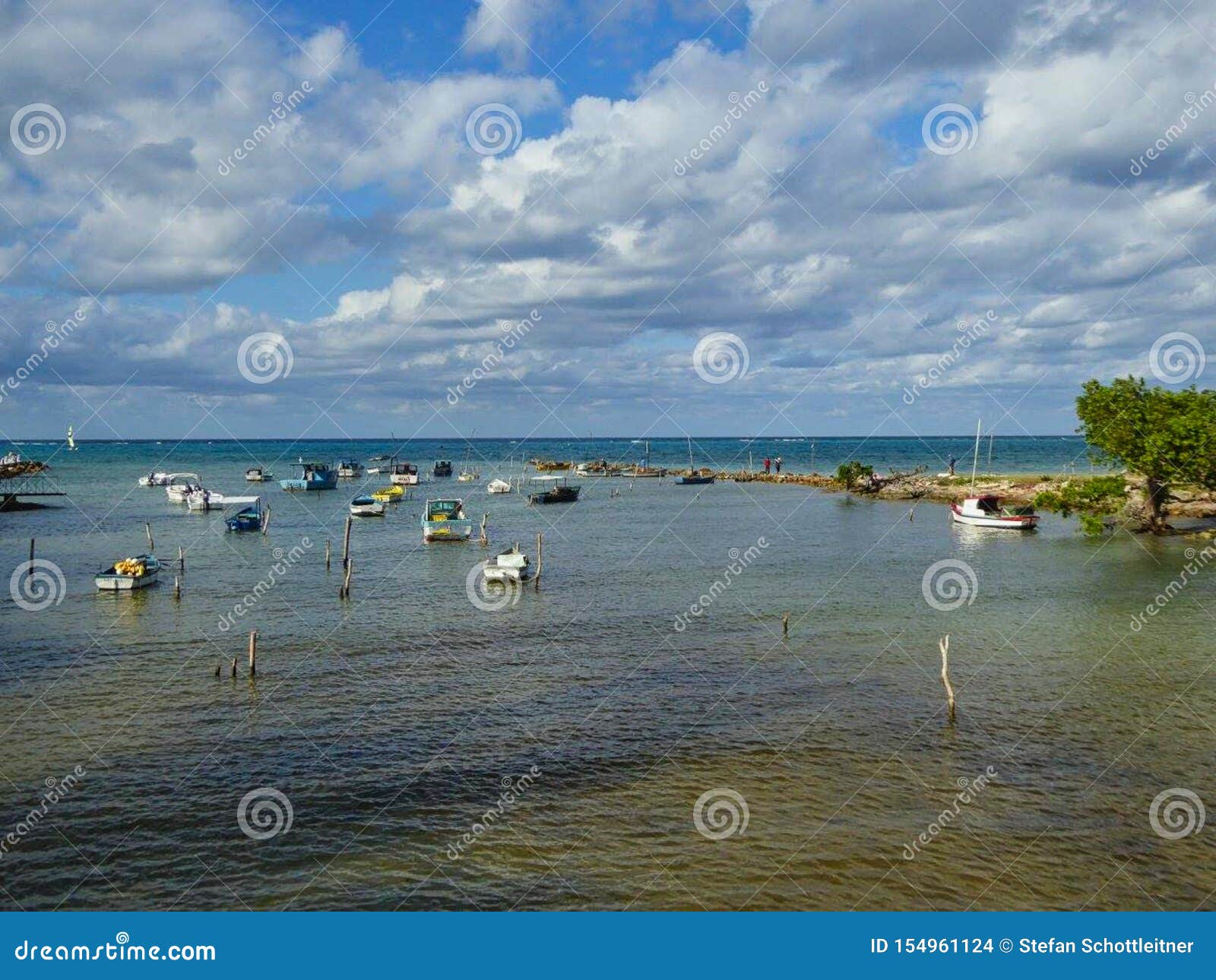 Small boats on the beach stock photo. Image of holiday - 154961124