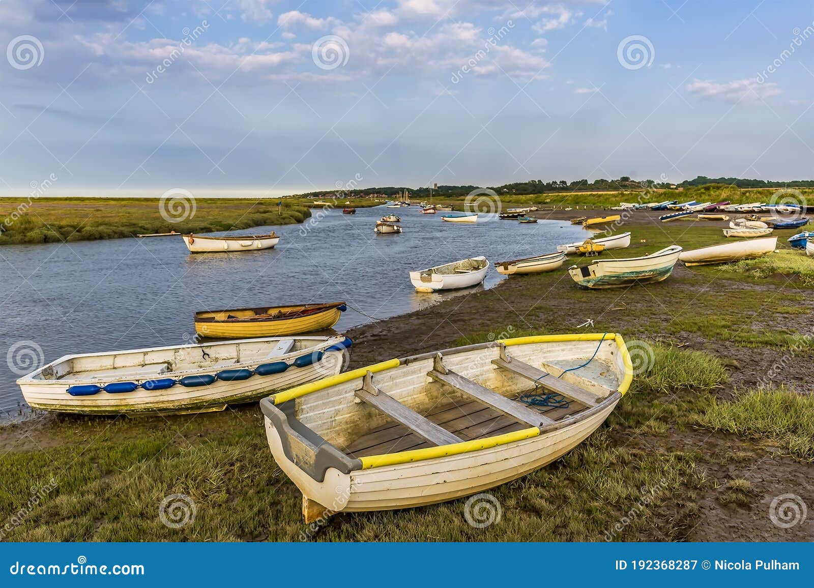 Small Boats Beached on the Banks of the River Glaven, Norfolk Stock ...