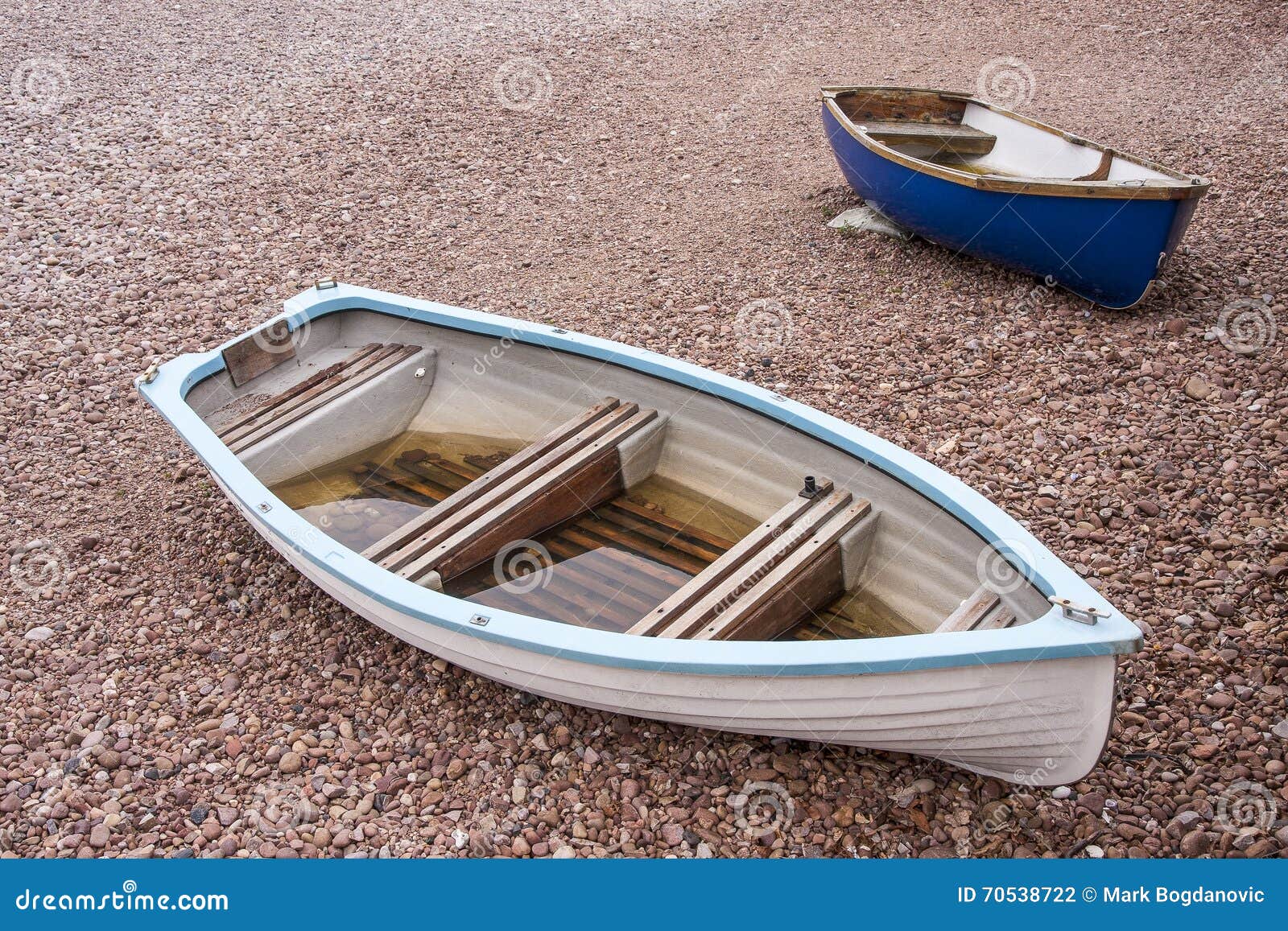 2 Small Boats on Pebble Beach Stock Photo - Image of bare, tide: 70538722